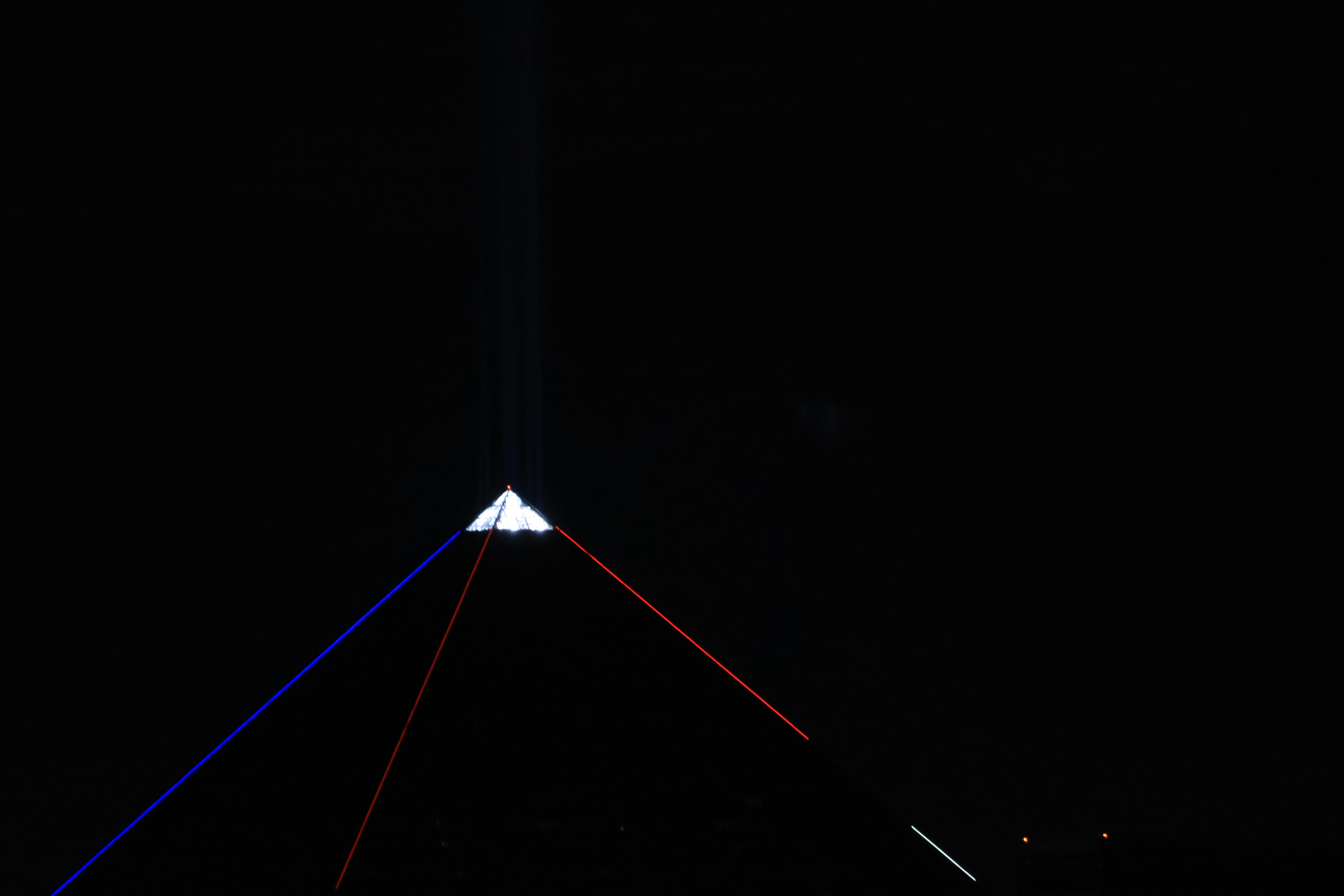 Pyramid Peak at Night: Light Trails Converge on a Lone Summit