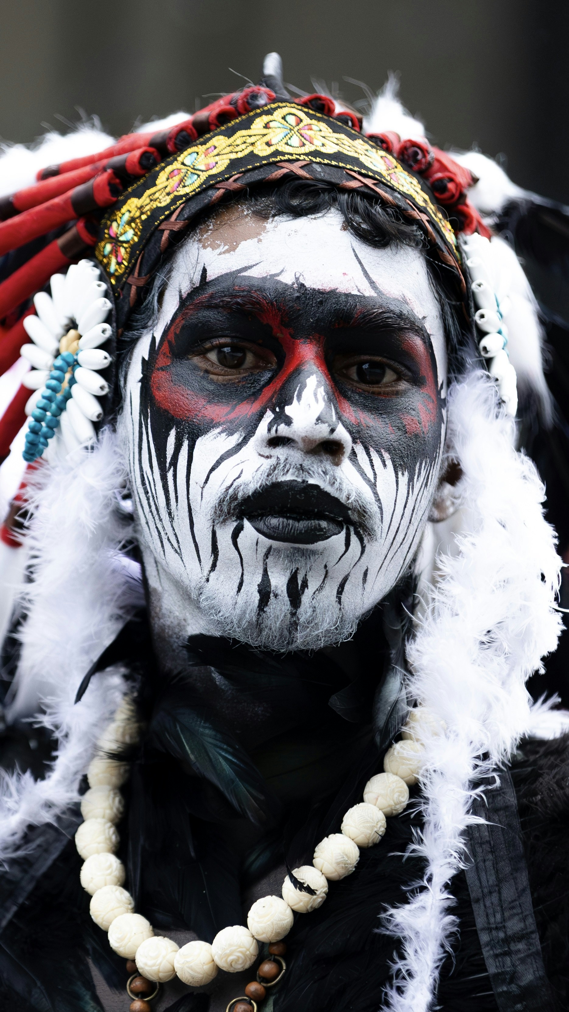 Charcoal Masks and Sacred Beads: A Night of Painted Silence