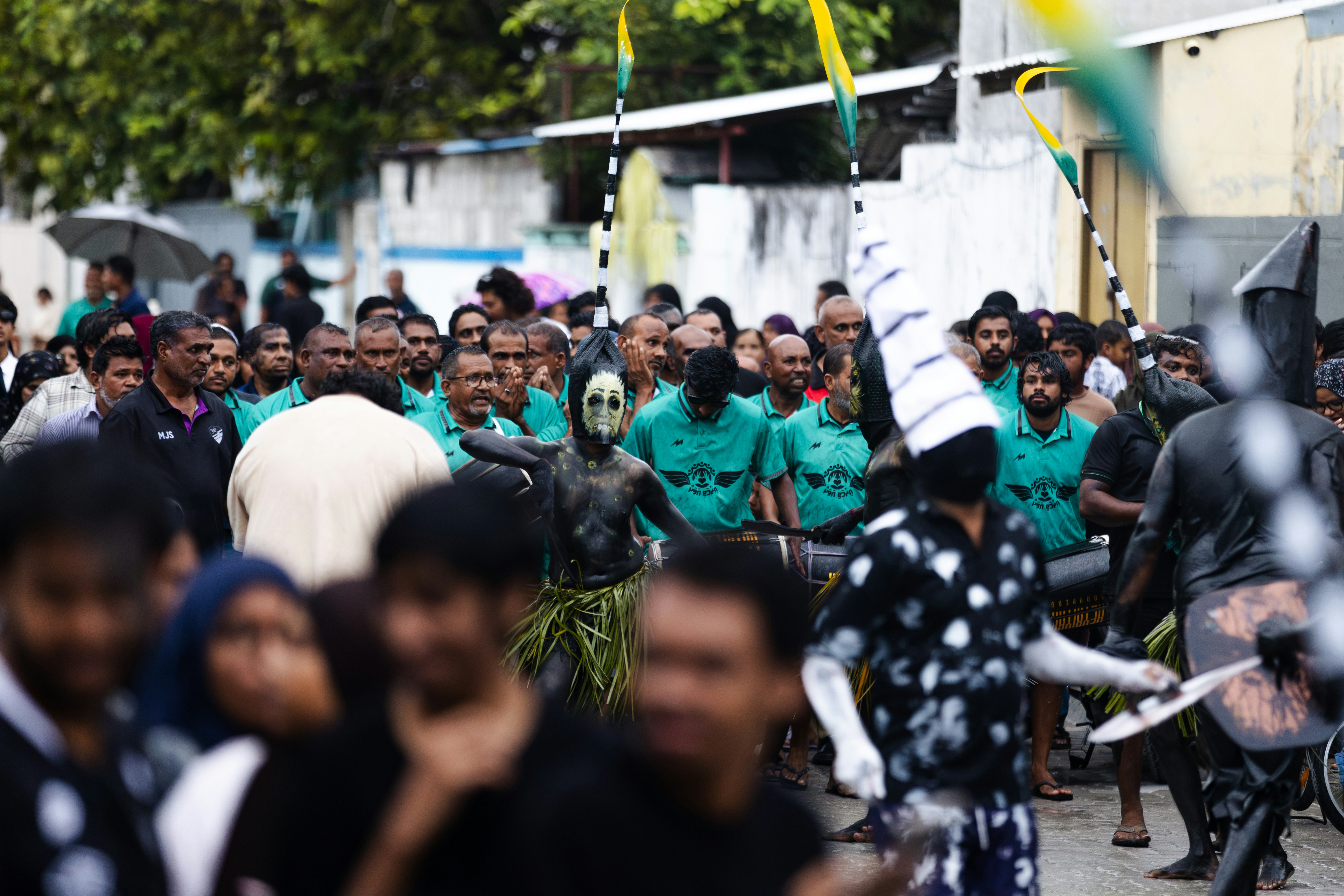 Masked Parade Amid a Sea of Green