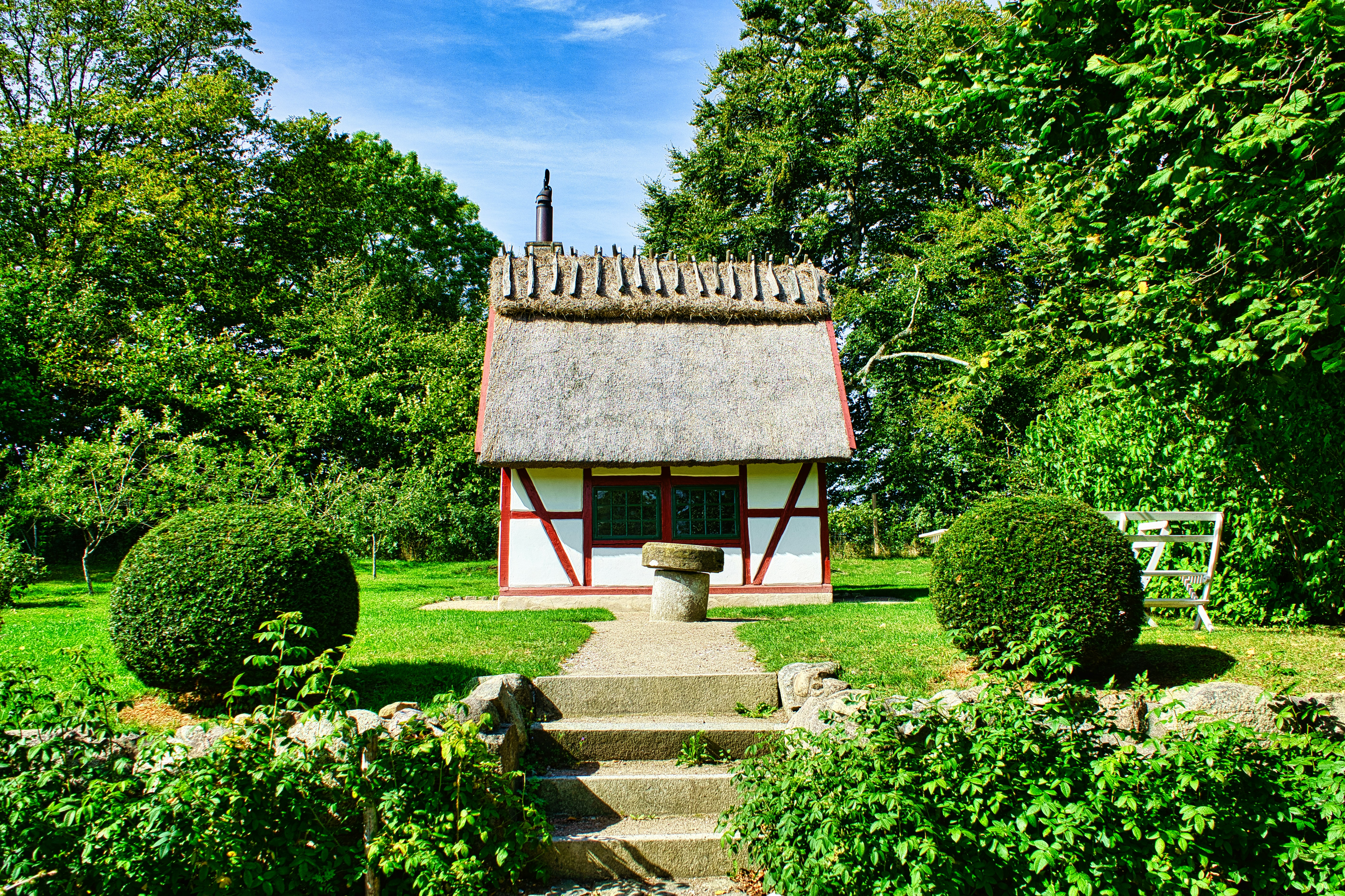 Tiny Shire Shrine: A Central Focus in Verdant Calm