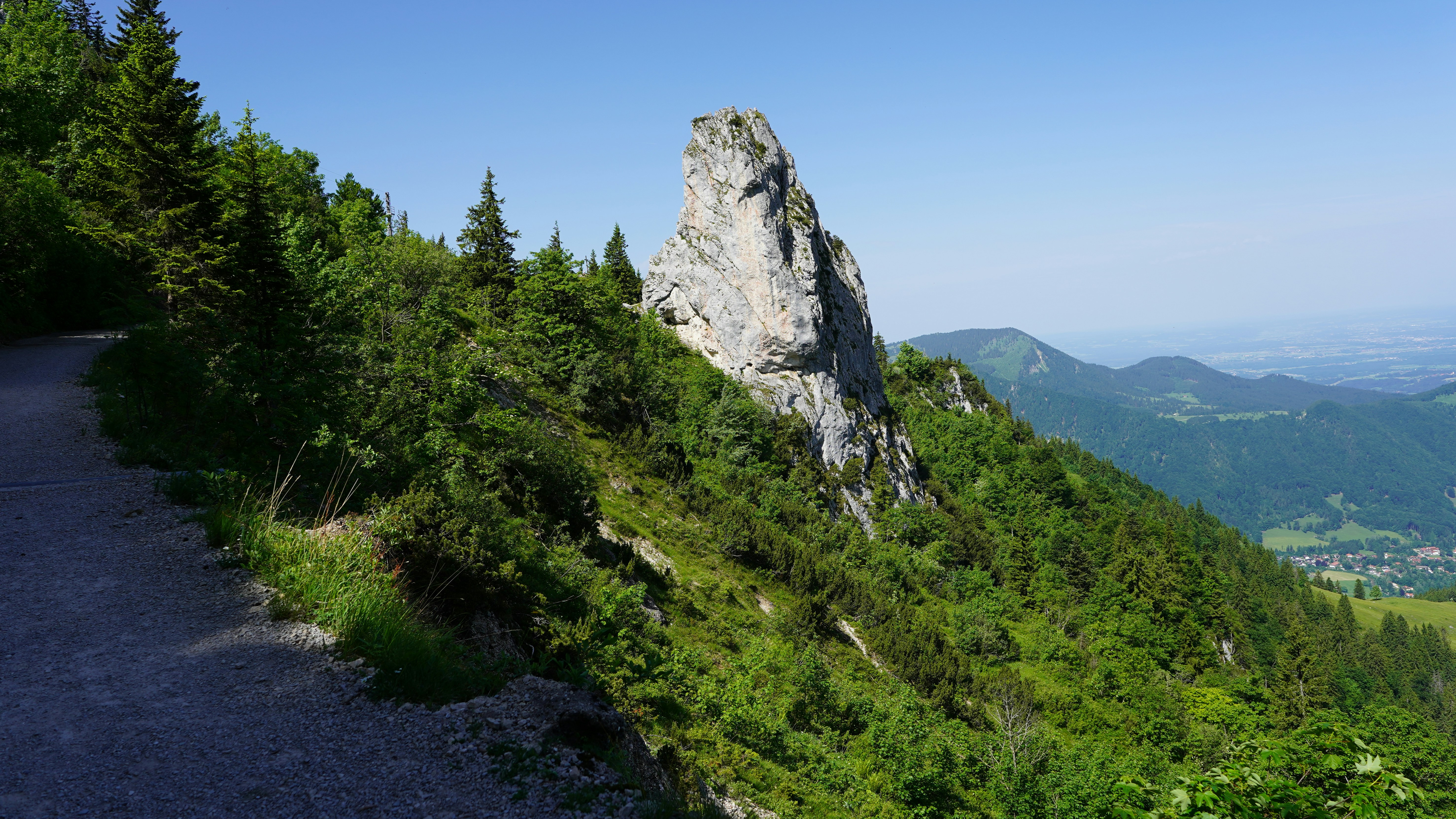Stone Sentinel: A Lone Peak Reaches Toward a Blue Expanse
