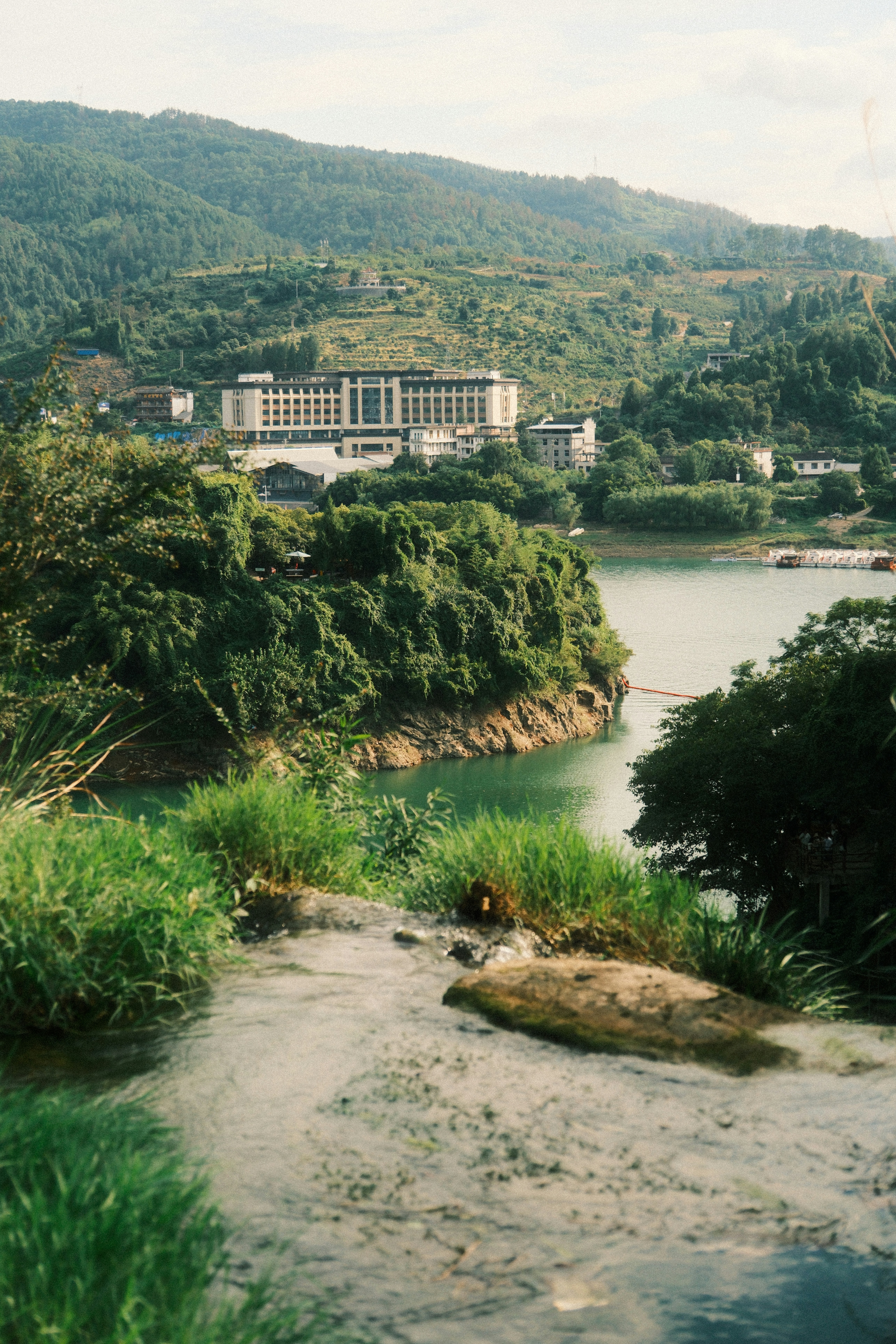 Riverside Terrace and Hilltop Hotel Nestled Amid Verdant Slopes