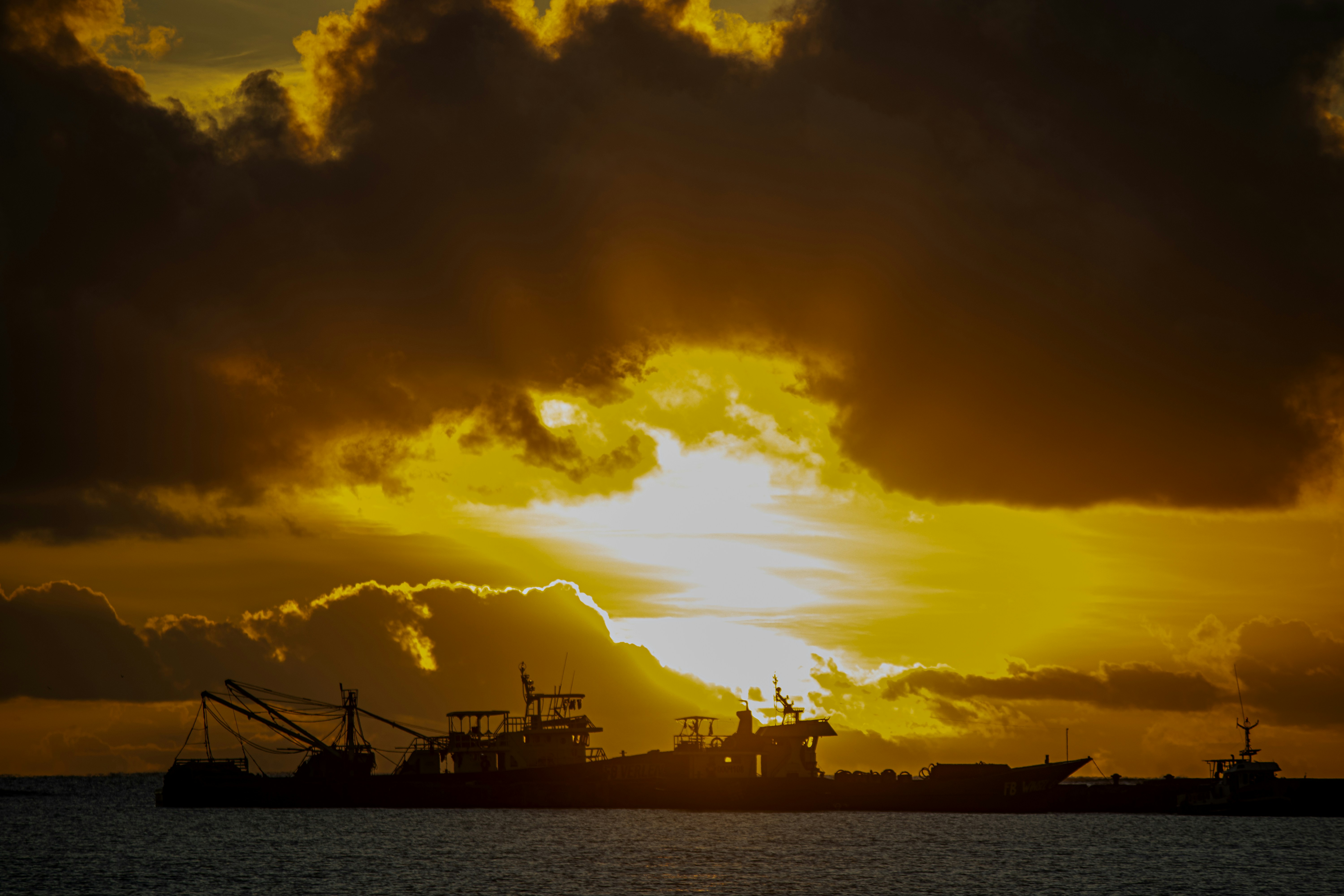 Sunlit Harbor Silhouette at Dusk