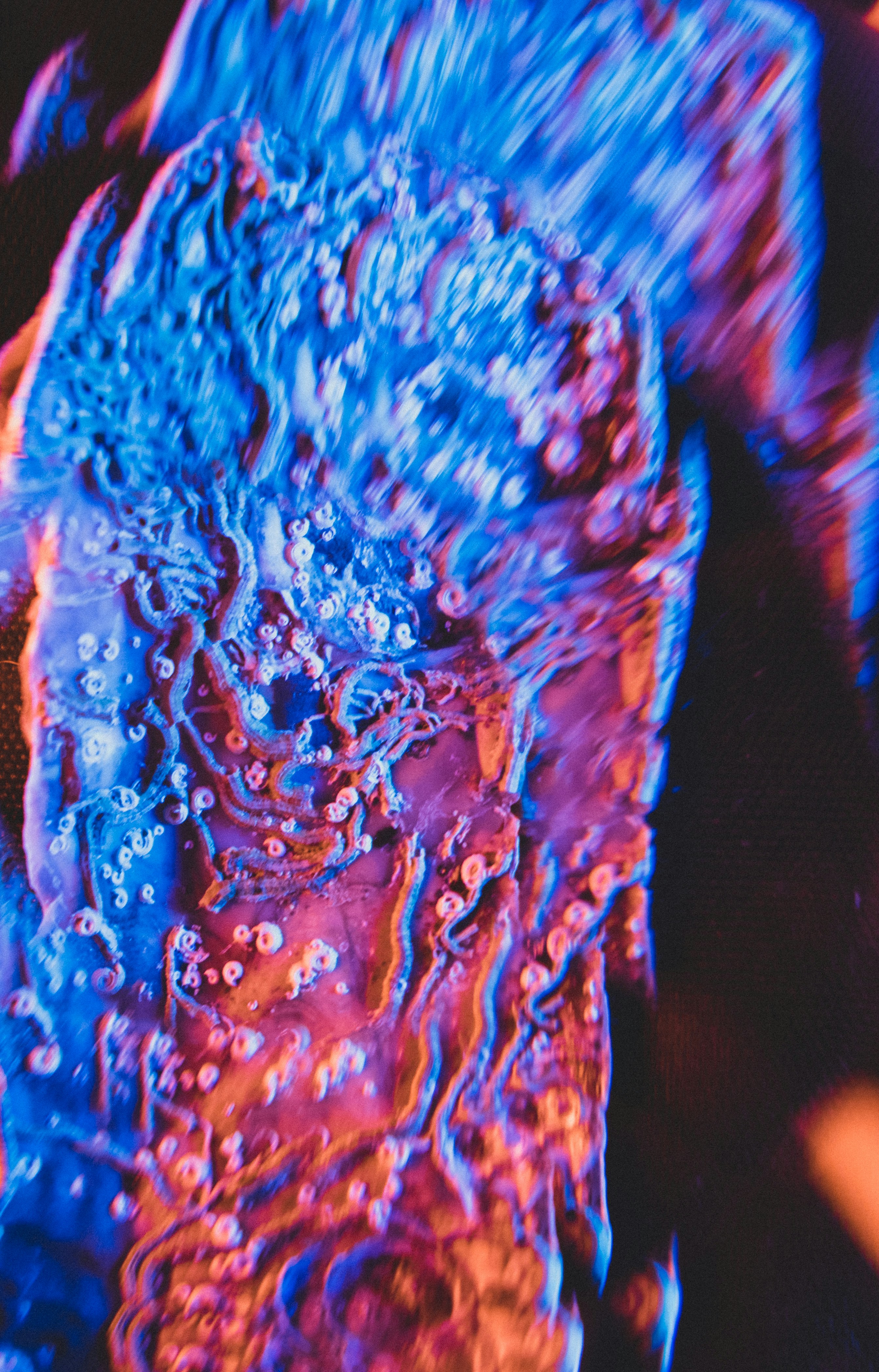 Chromatic Ice: Fluid Blues and Fire in Macro Abstract