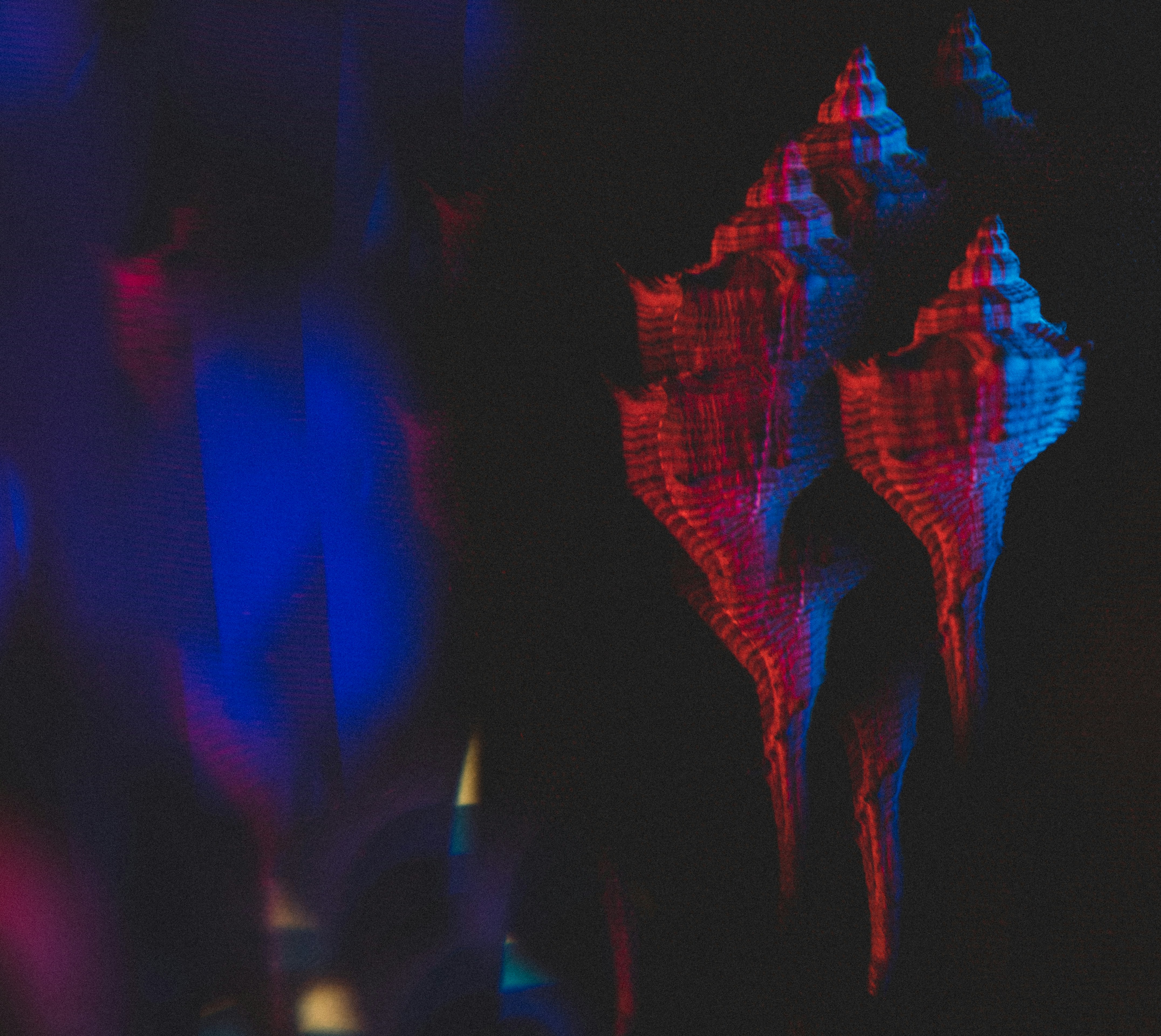 Chromatic Ghosts: Red and Blue Icicles in Low Light