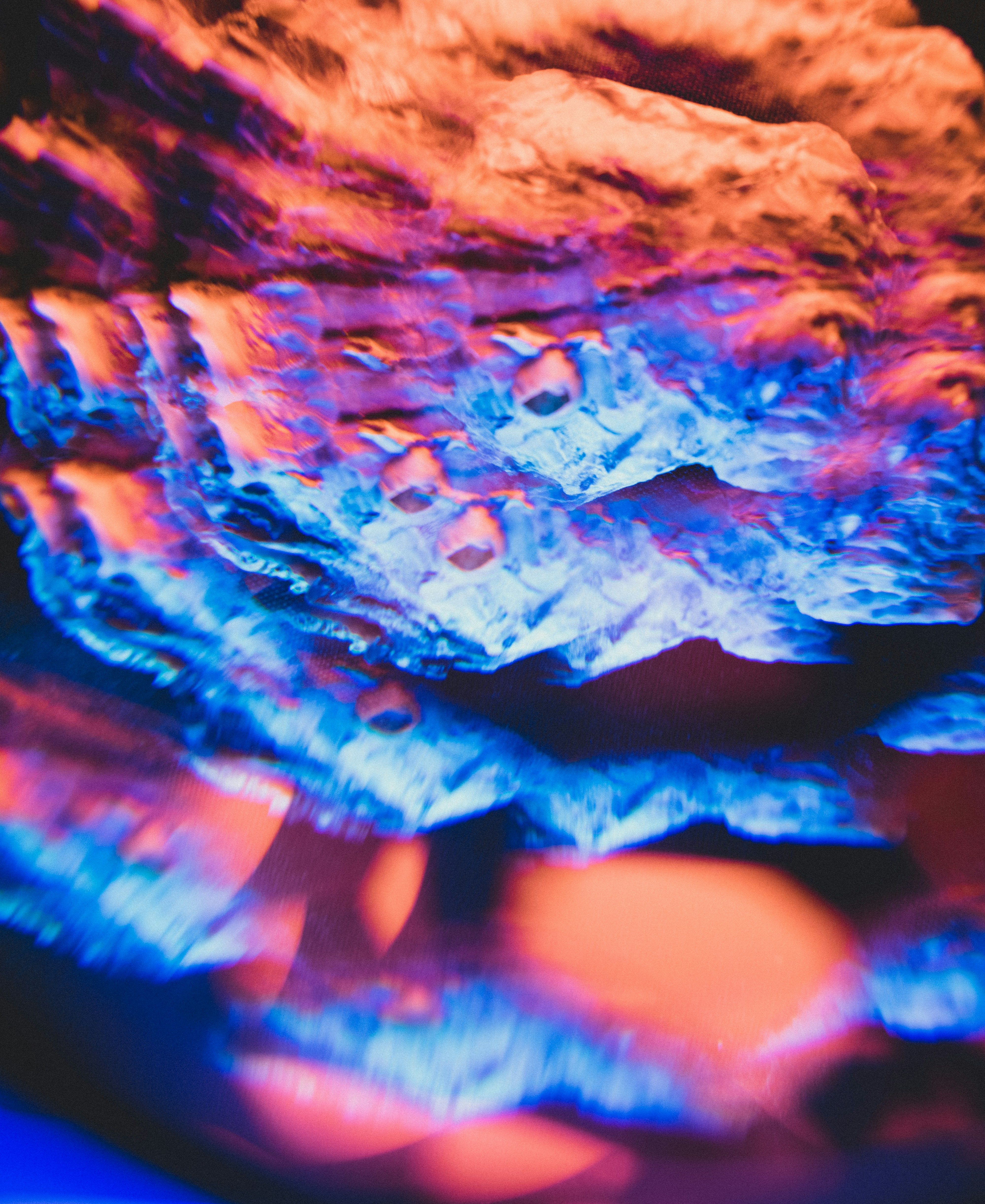 Iridescent Ice: Abstract Blue-Orange Ripplepelt