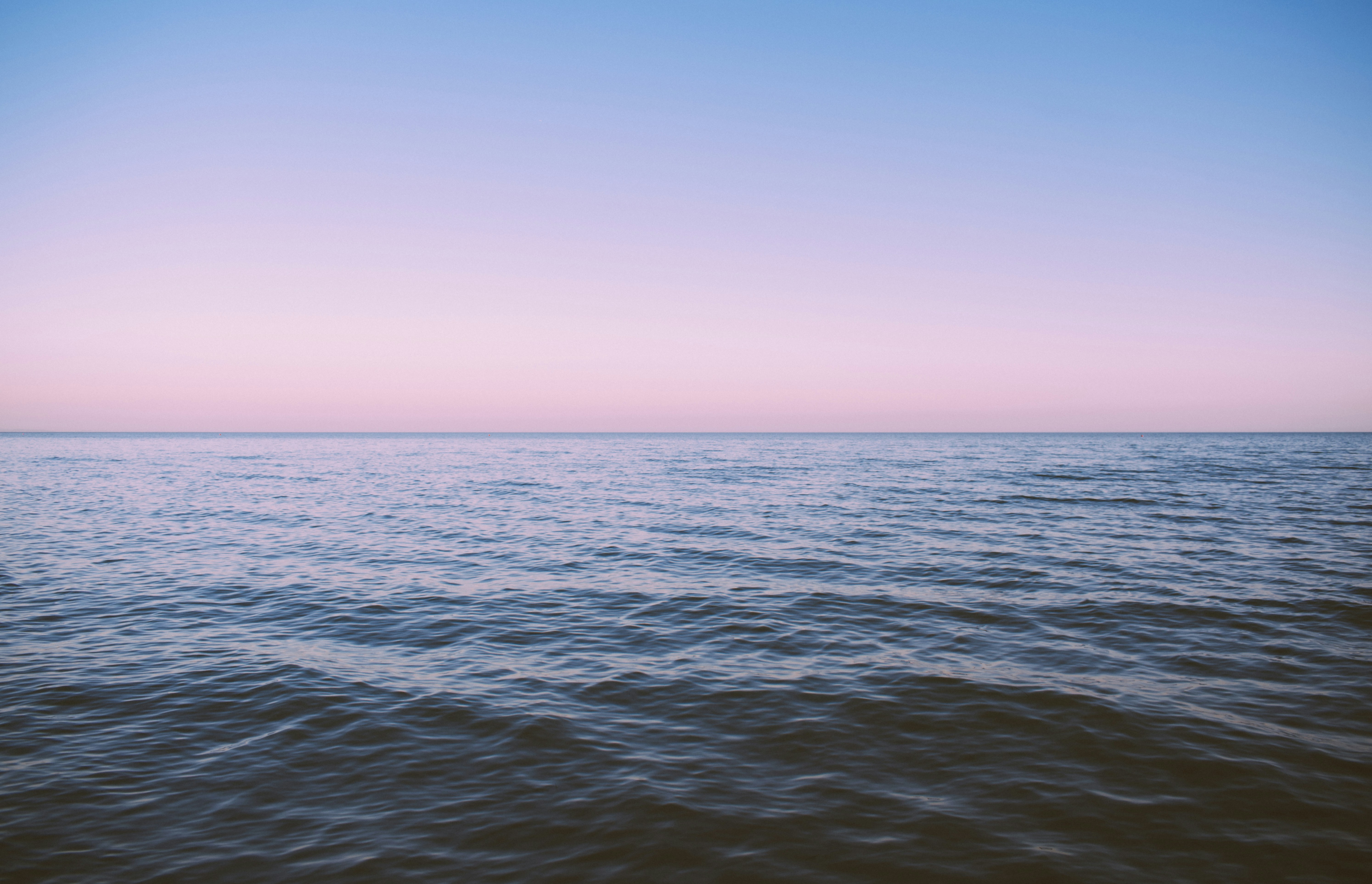 Horizon Quiet: A Calm Sea at Twilight
