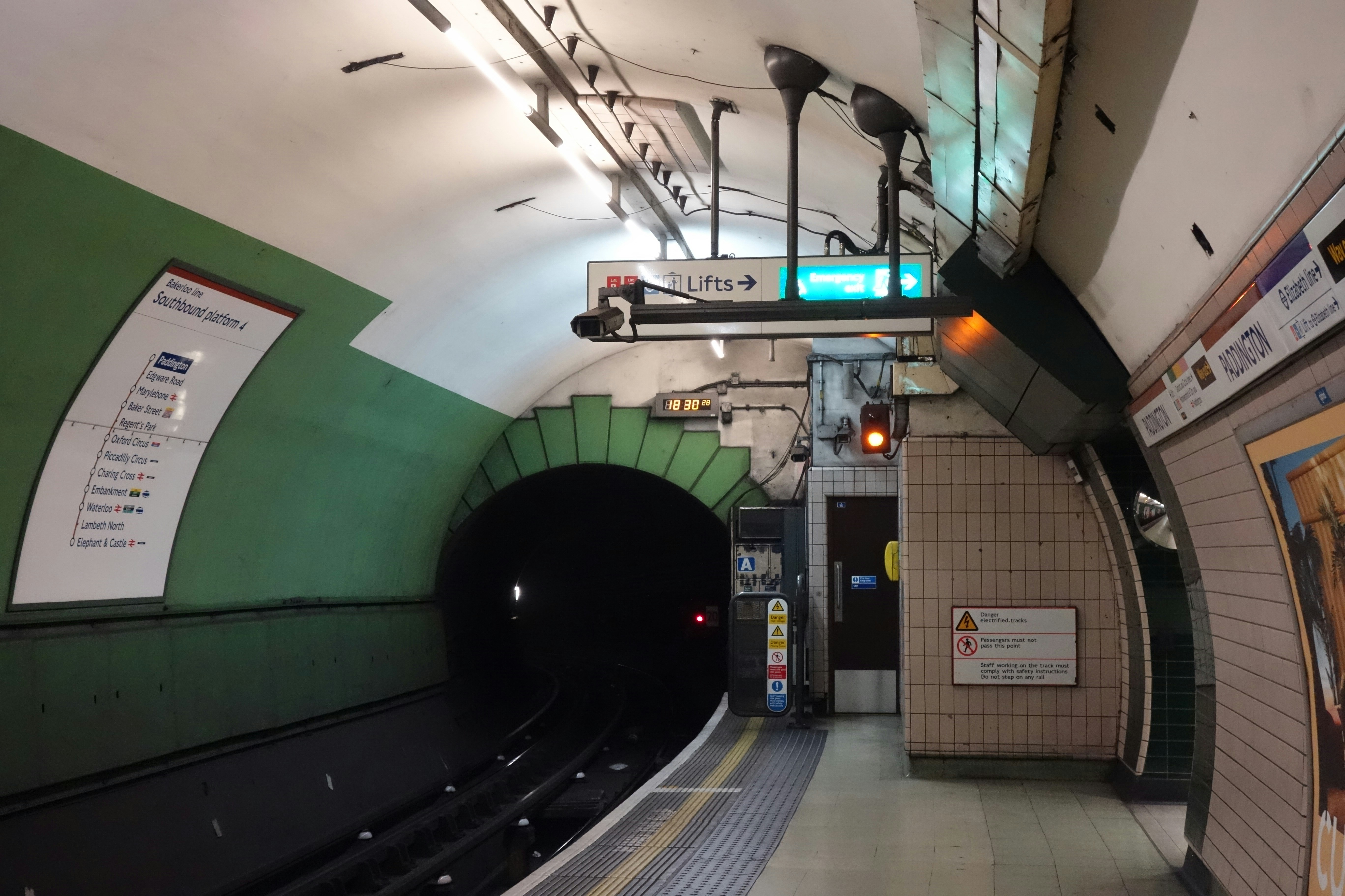Underground Platform Gaze Toward the Tunnel Gate