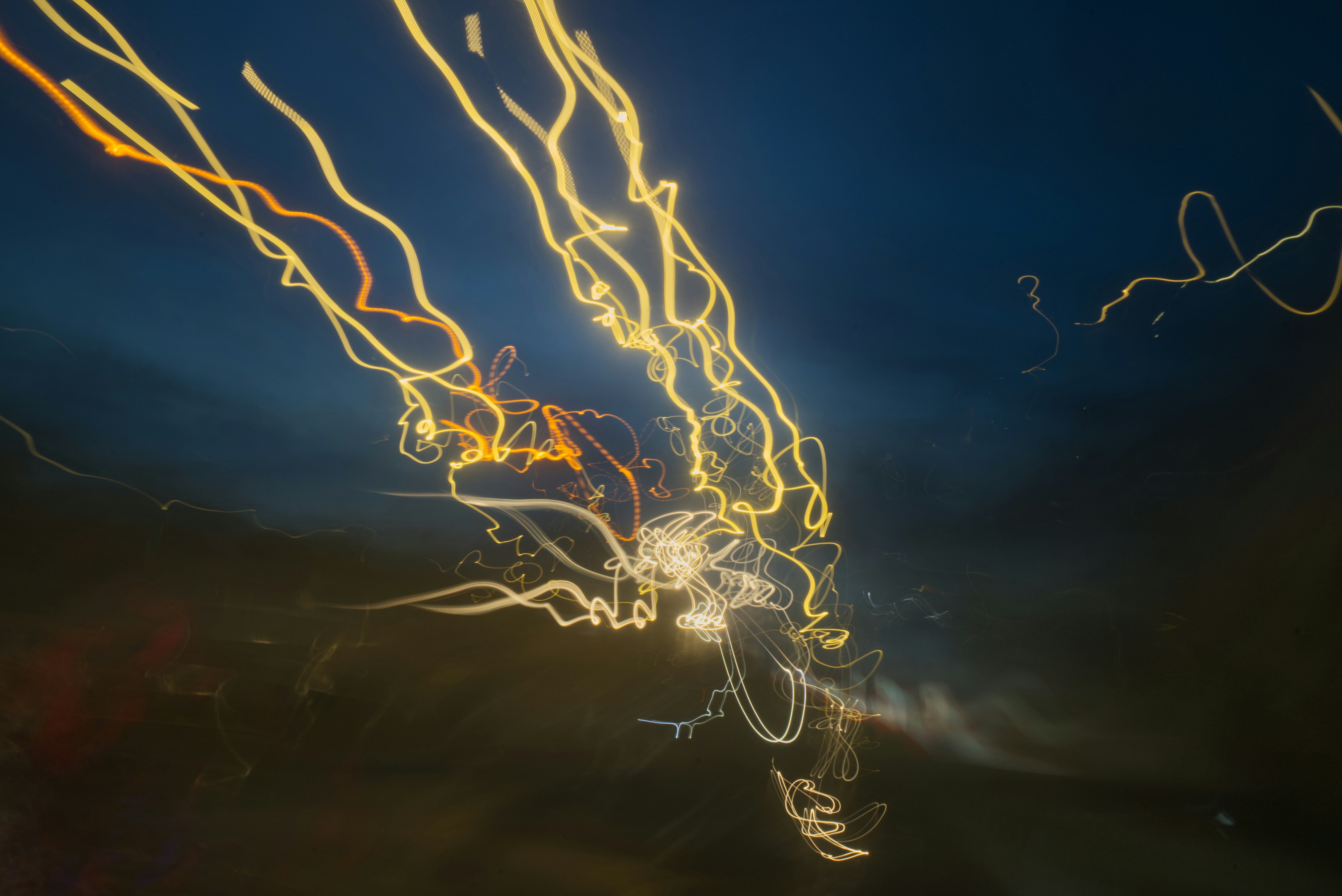 Nightstreet Whorls: Neon Trails Across a Quiet Horizon