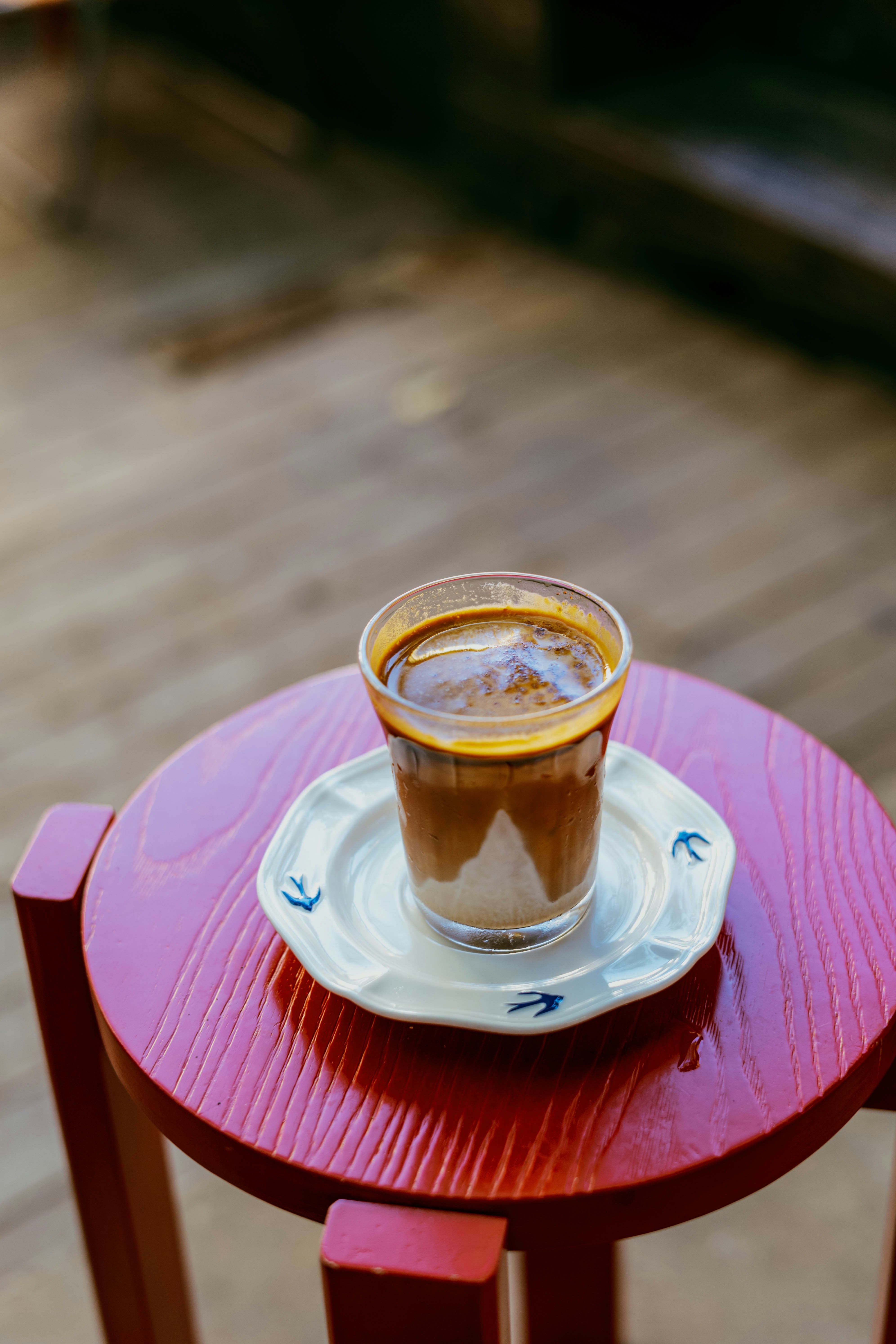 A Quiet Espresso Moment on a Red Table