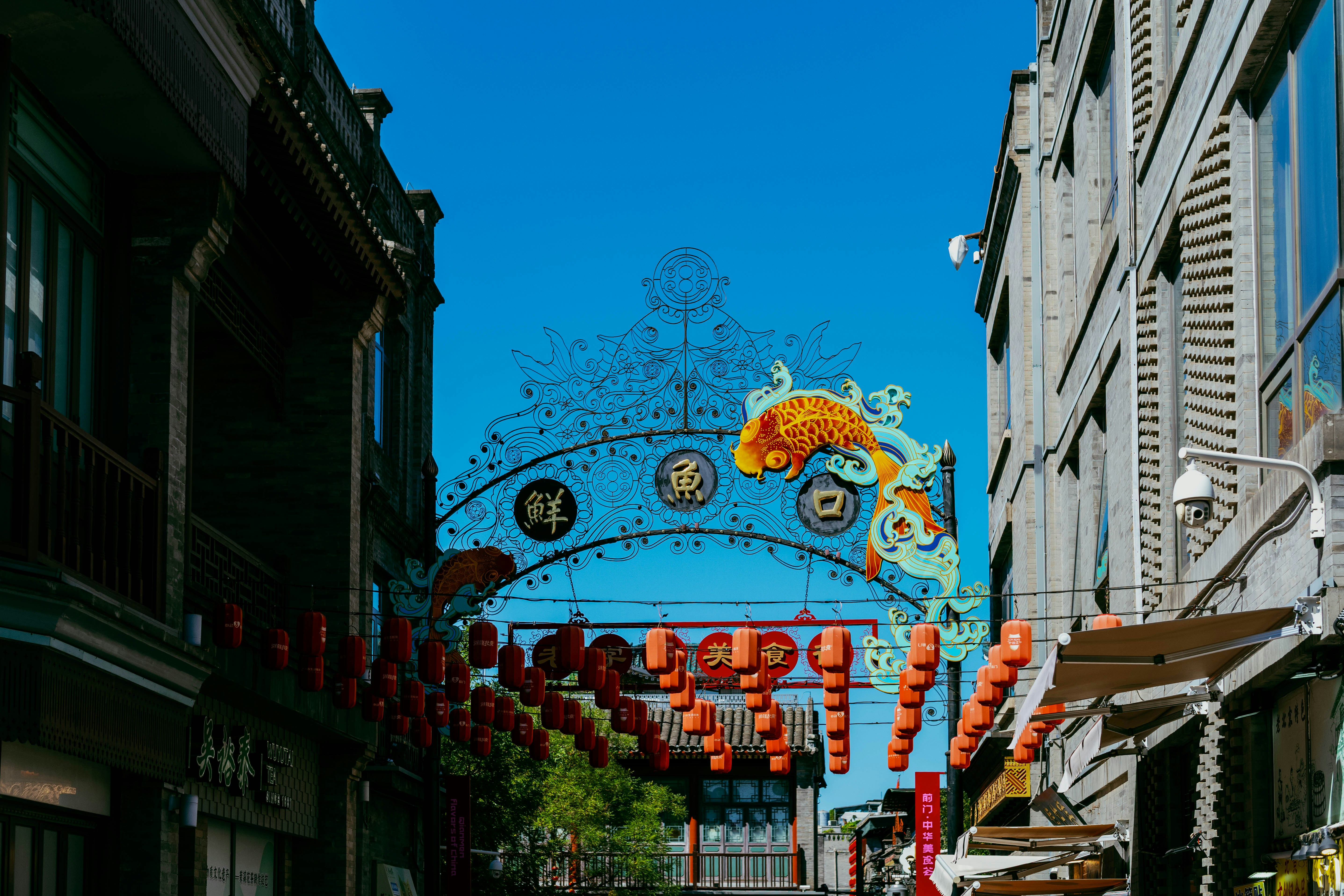 Festive Archway Over a Bustling Chinatown Street