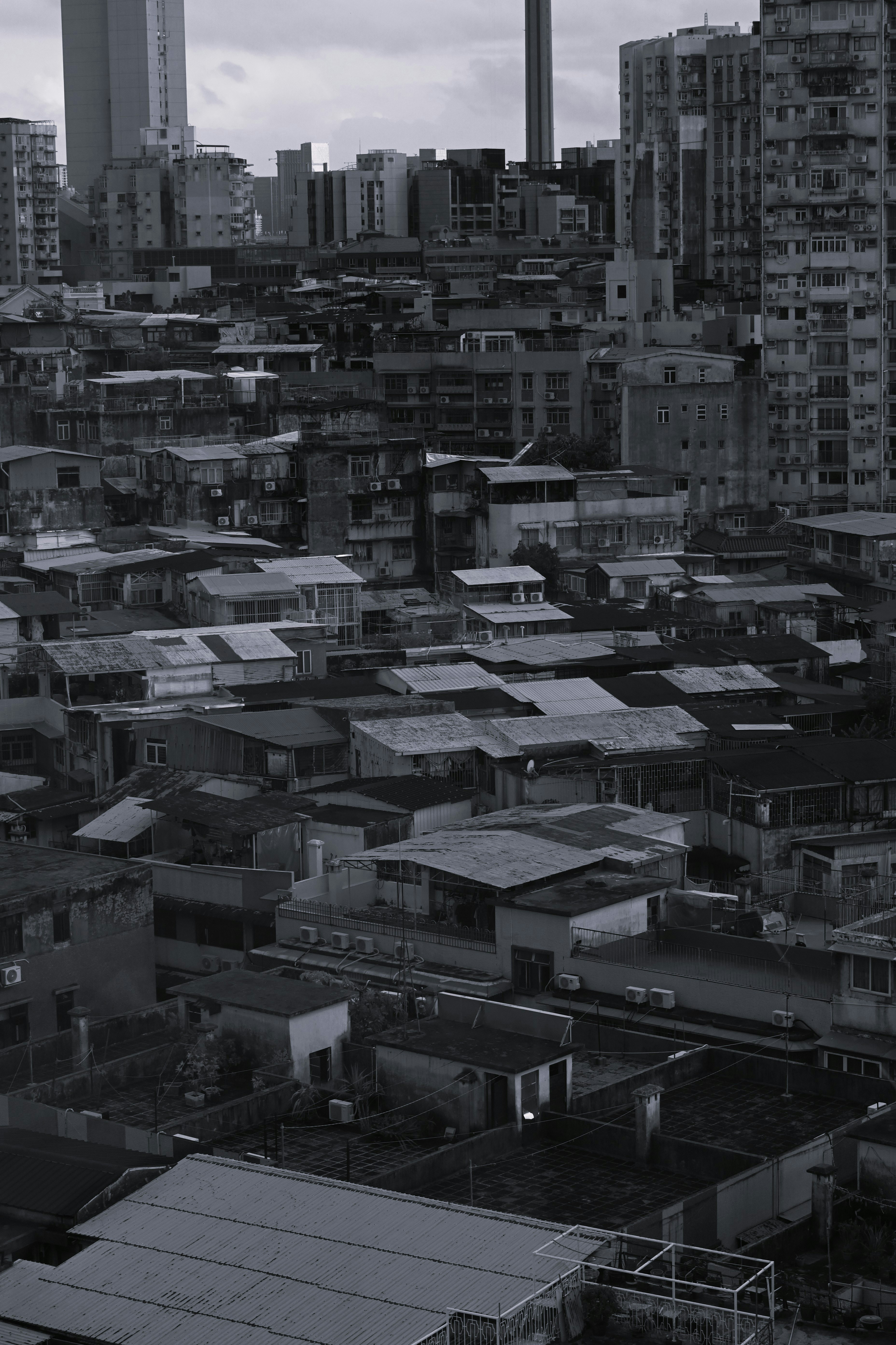 Urban Density in Monochrome: A Sea of Rooftops and Towers