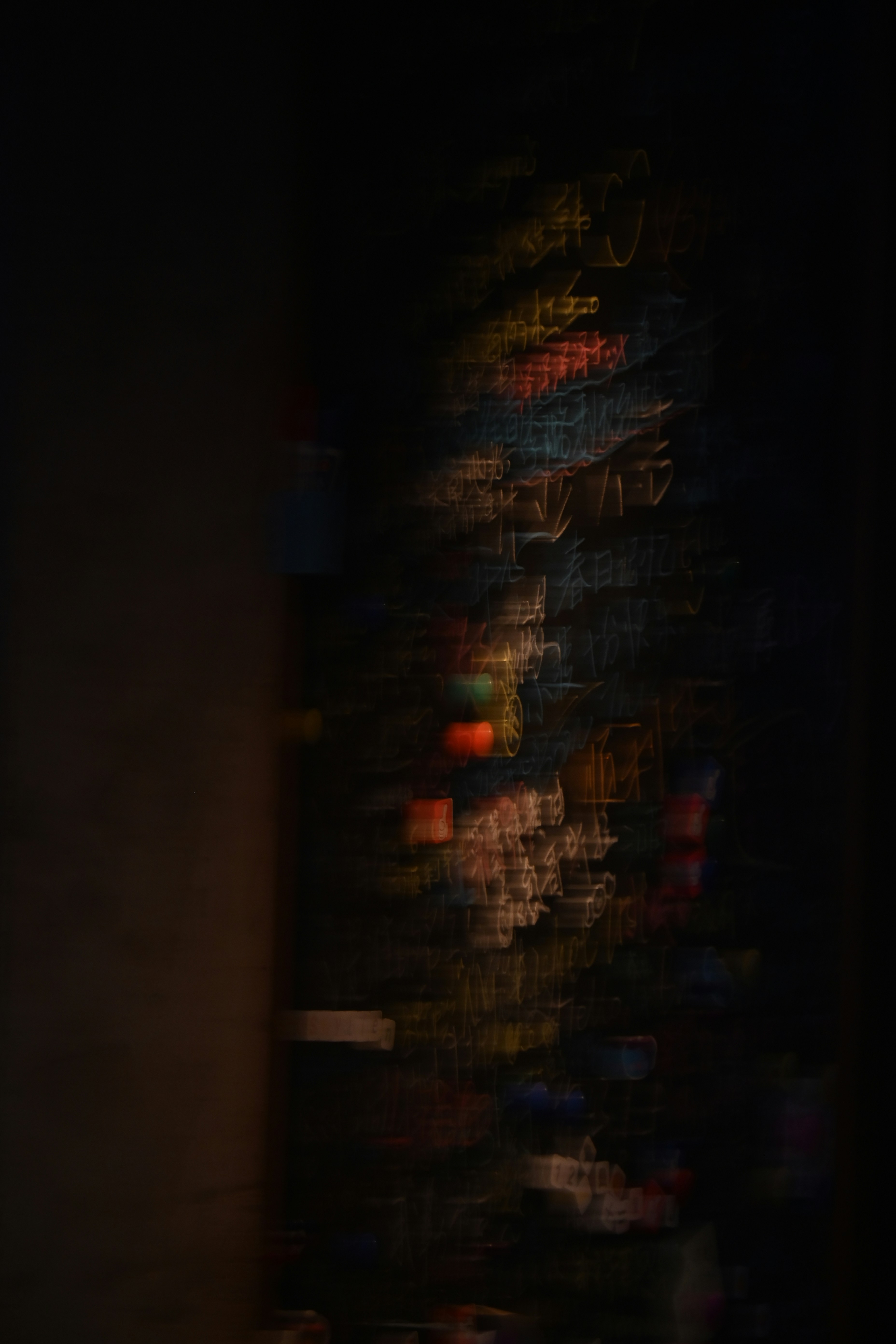 Blurred Nightfall: Neon Streaks in a Dim Corridor