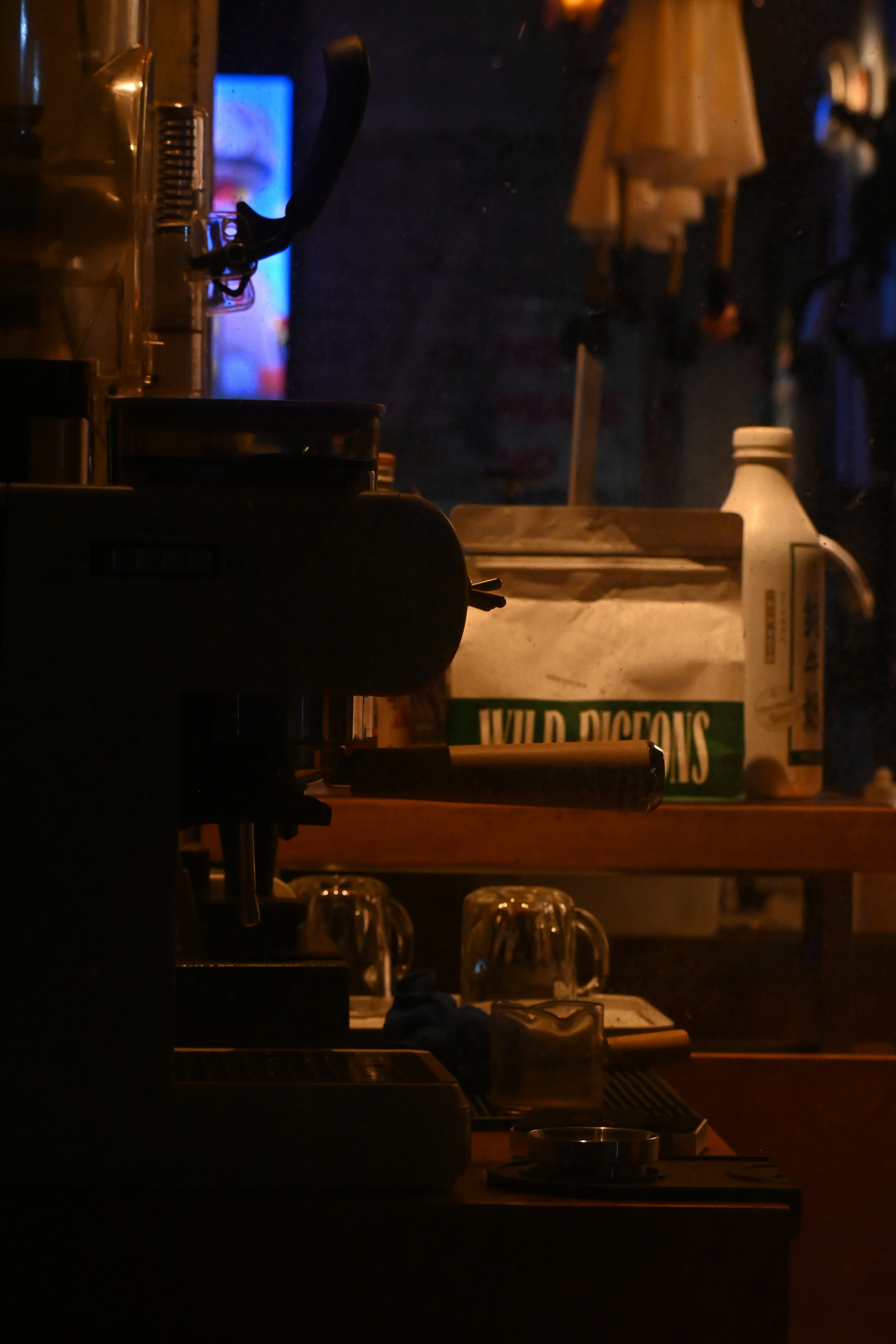 Morning Brew at the Bar: A Dimly Lit Espresso Machine Scene