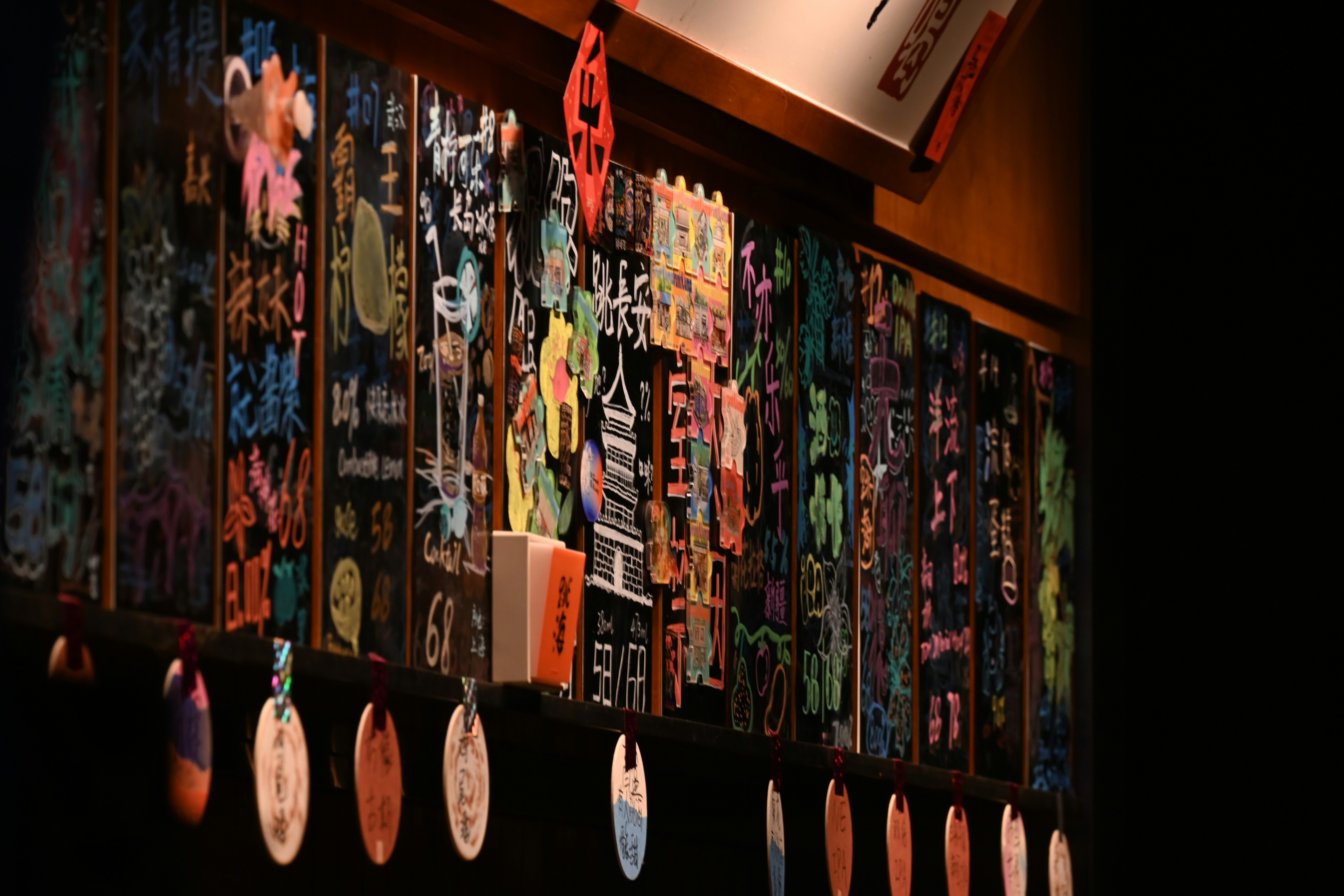 Neon Chalkboard Palette: Wall of Colorful Japanese Lanterns and Signage
