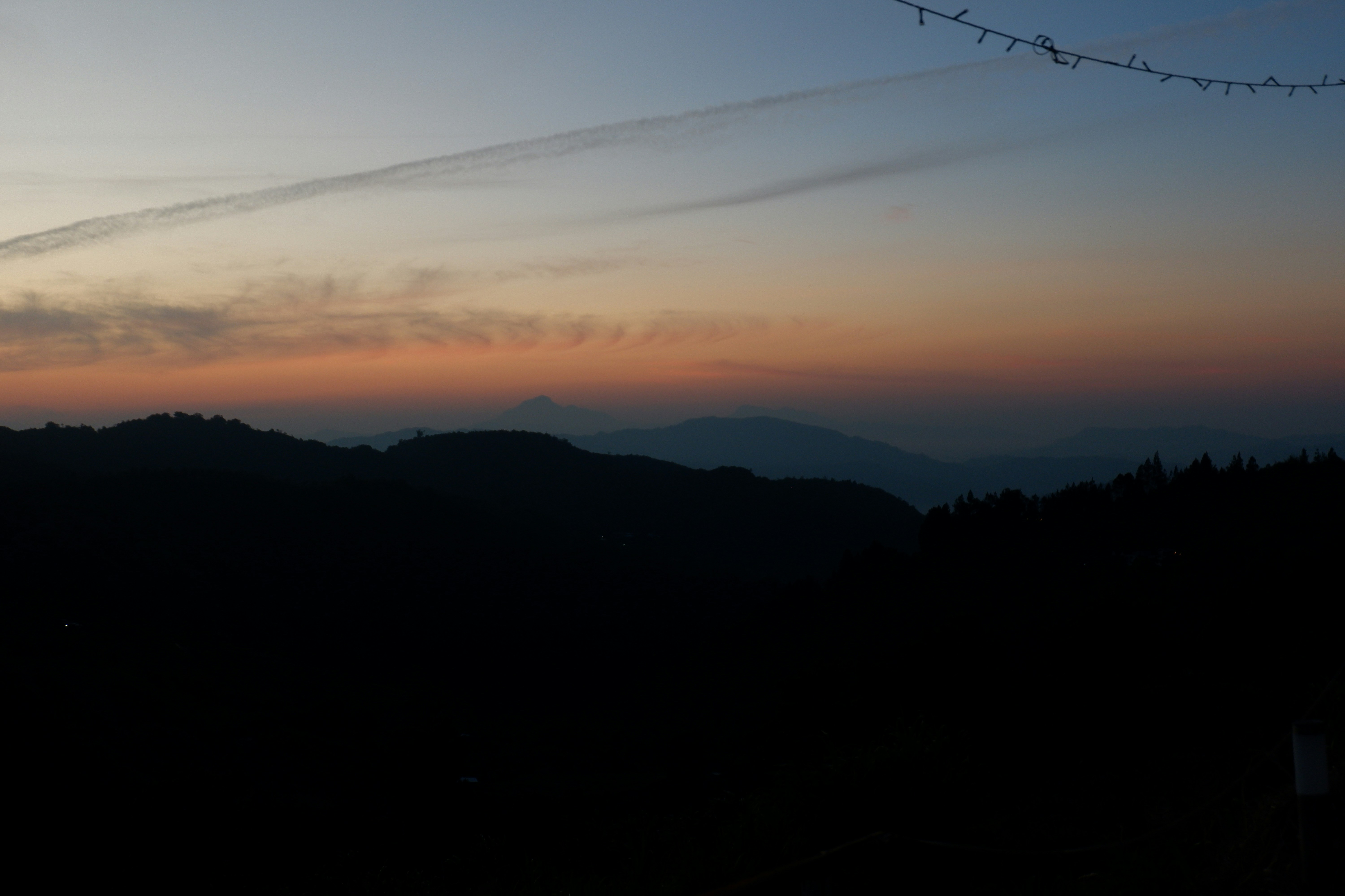 Dusk Over the Ridge: Quiet Horizon Under String Lights