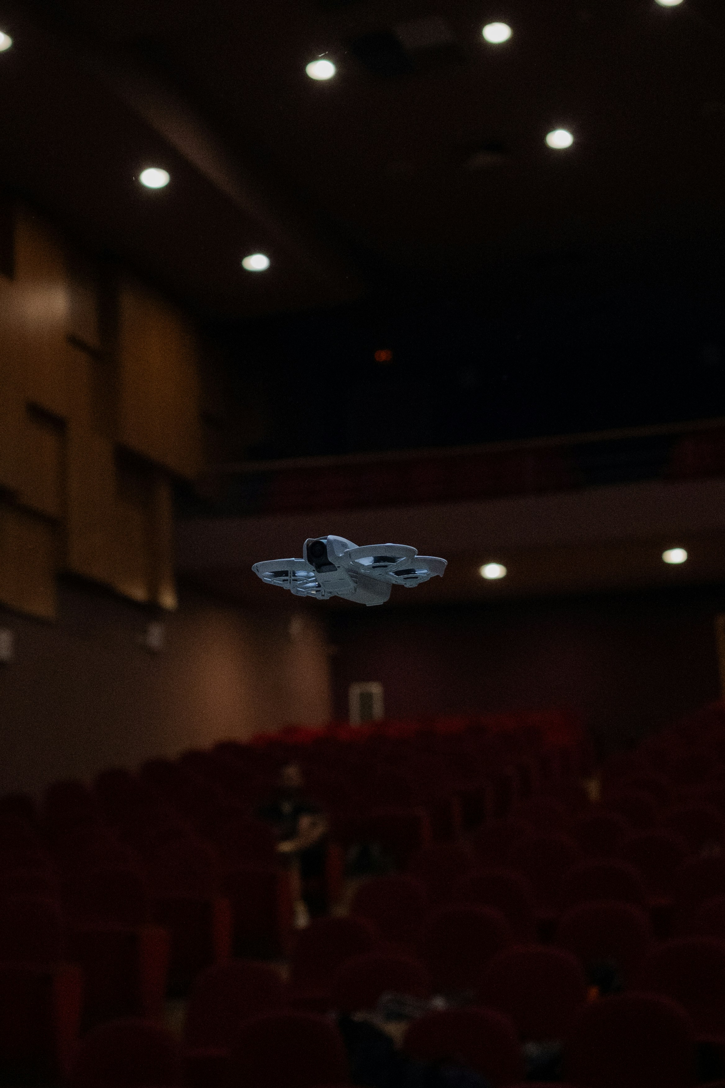 Midair Skies: A Nano-Creuse of a Model Drone in a Dim Theater