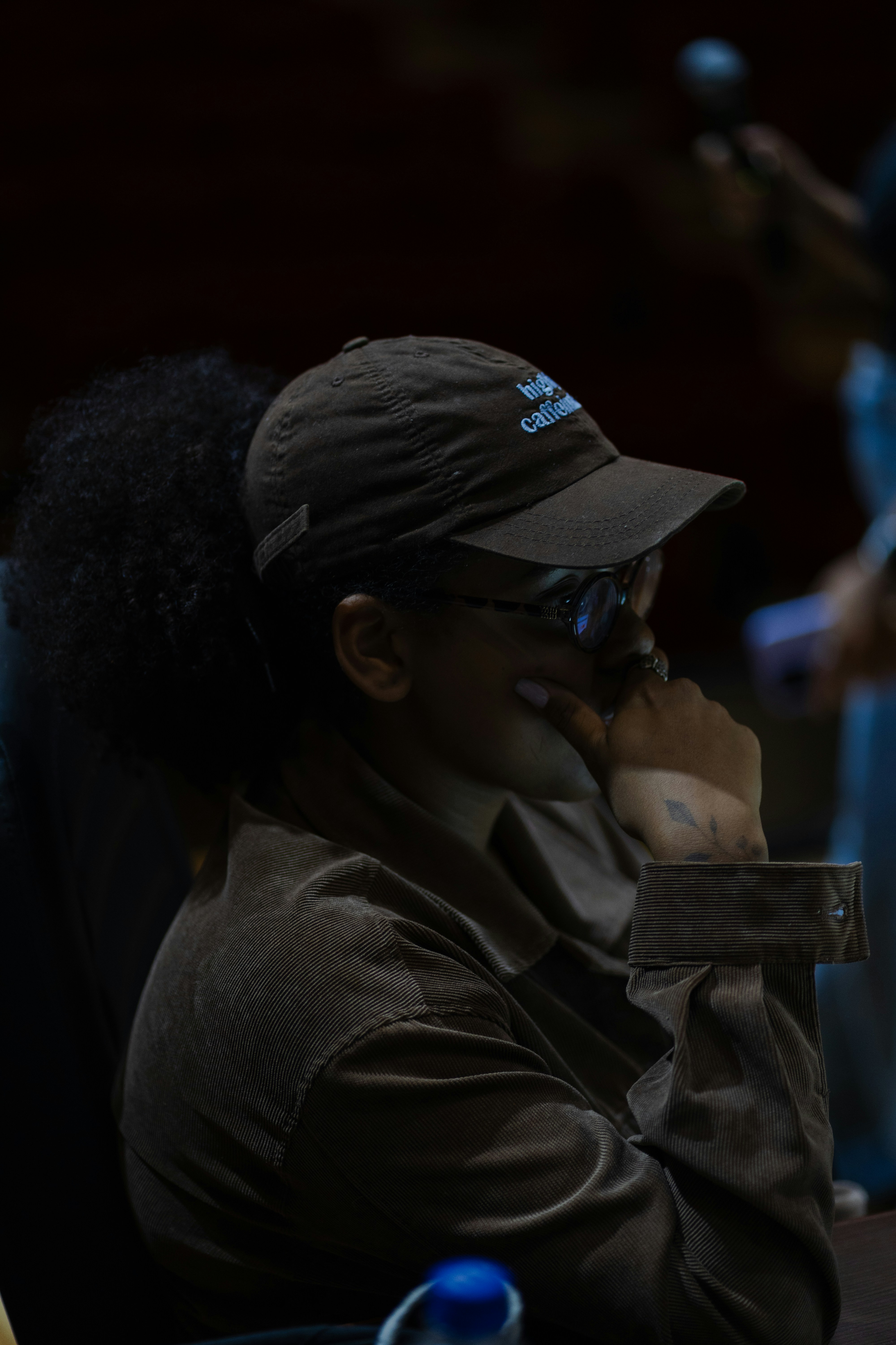 Midnight Focus: Contemplative Moment in Soft Portrait Lighting