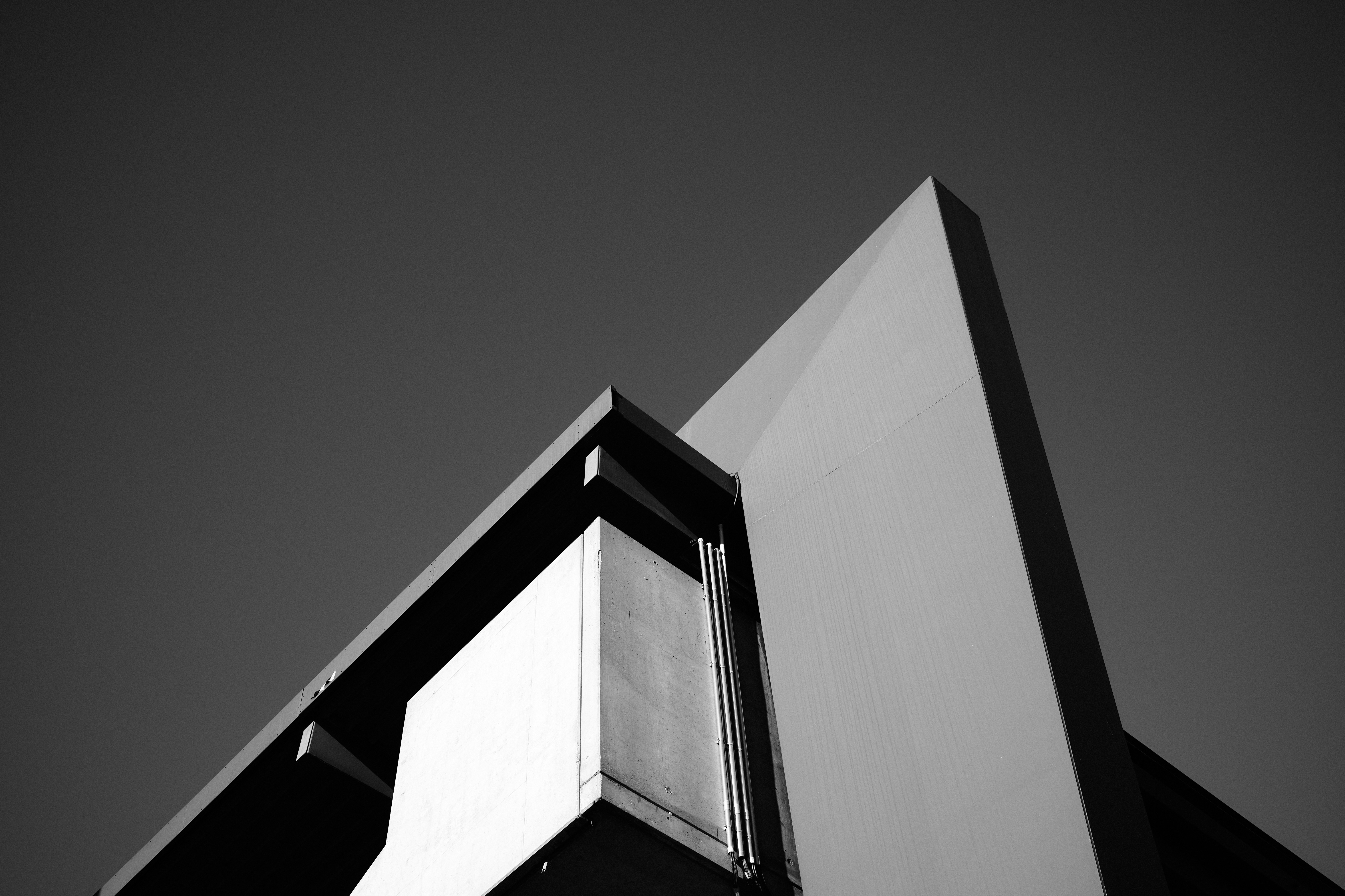 Angular Facade: Monochrome Geometry at Dusk