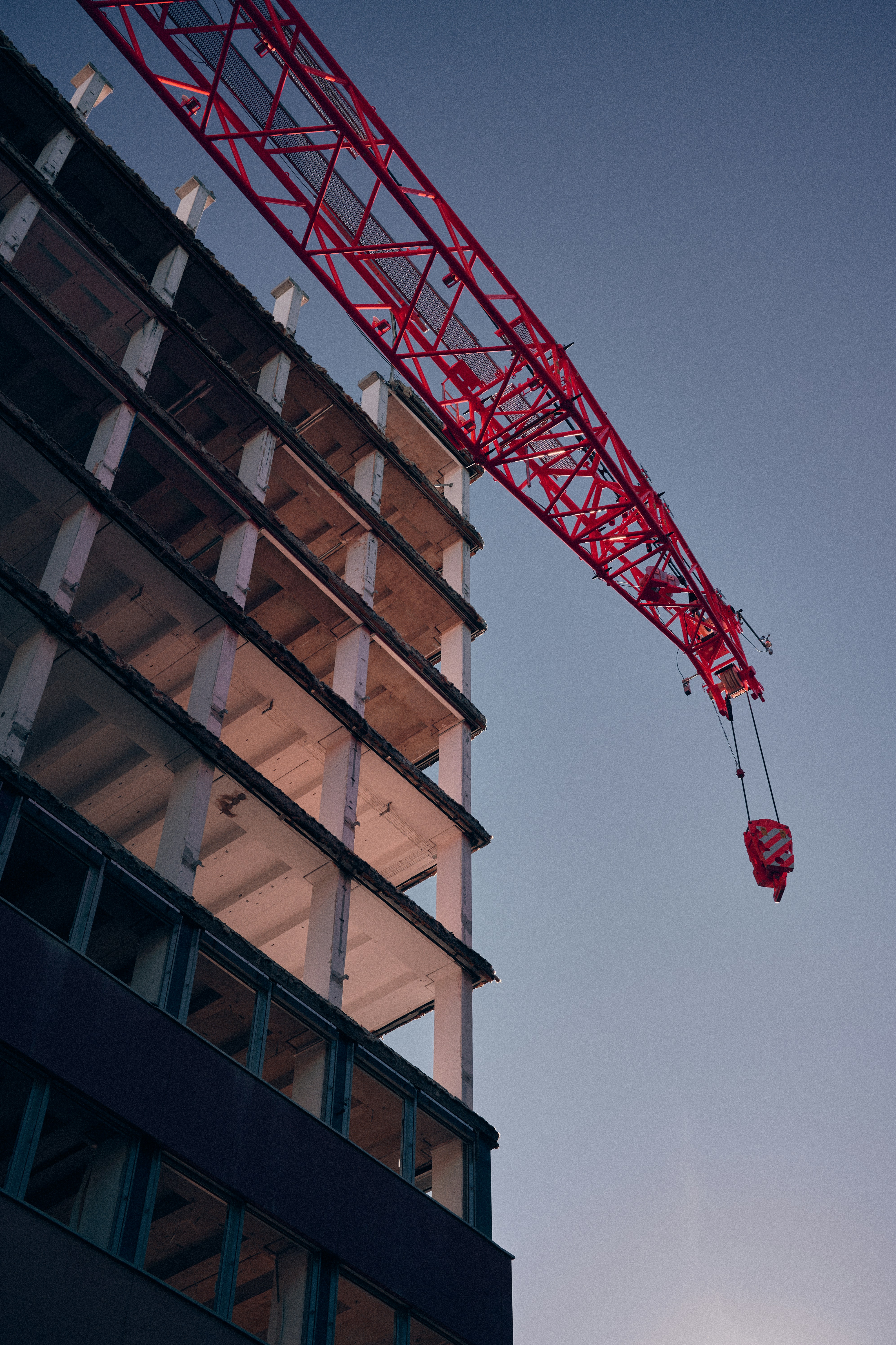 Crane Ballet over a Waking Construction