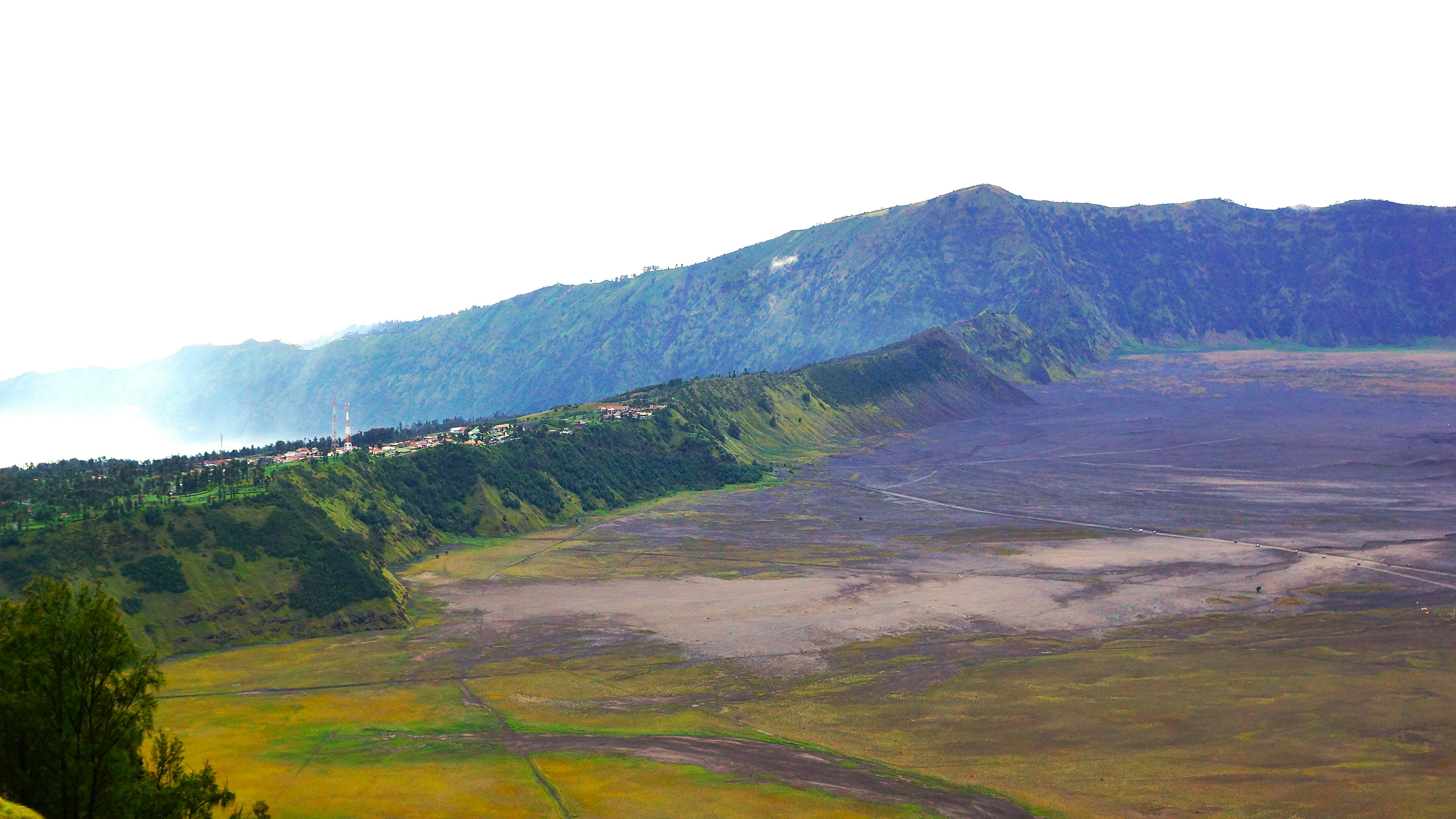 Crater Plain at Dawn: Charred rim and emerald verge