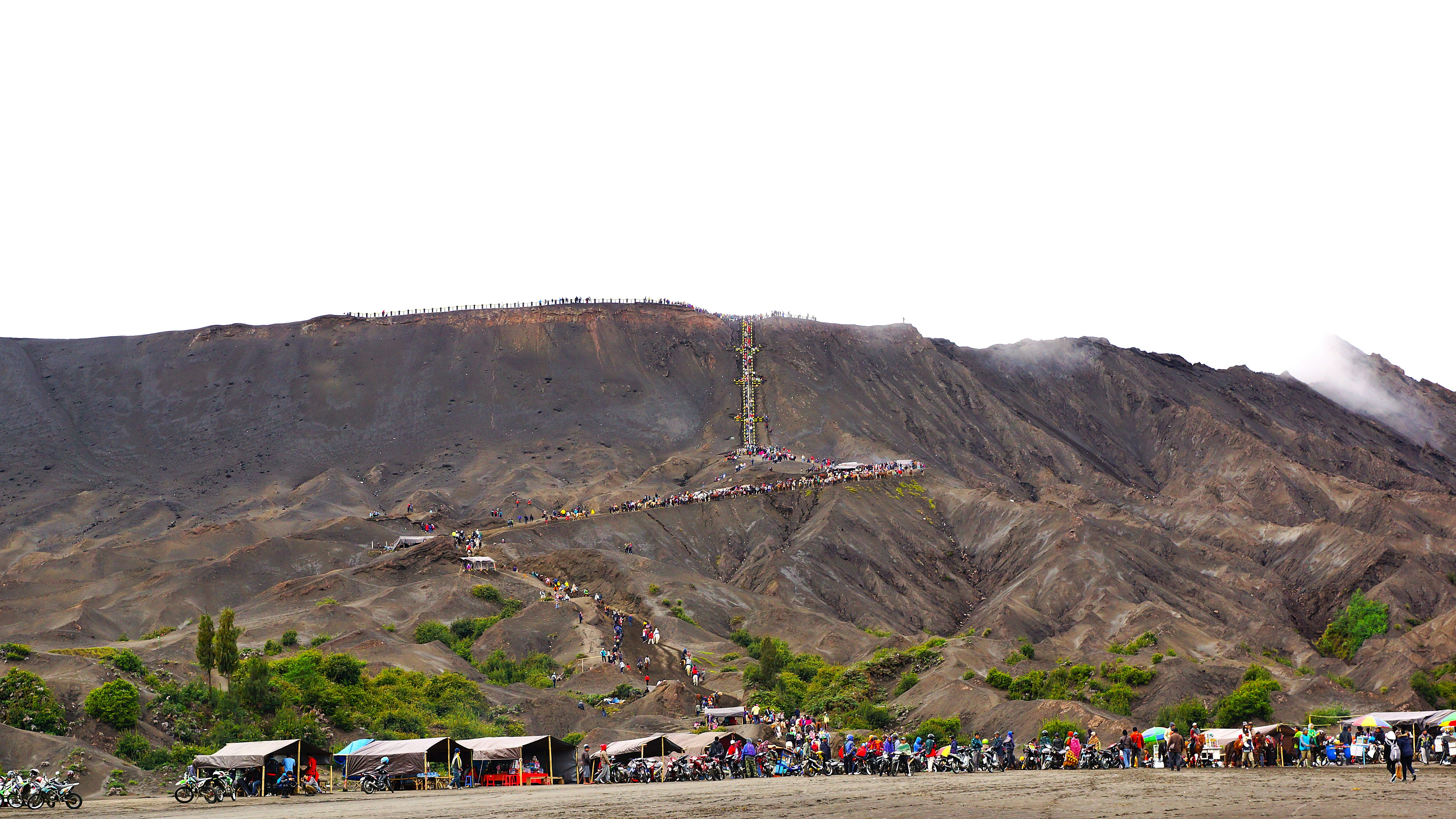 Ridge Line Circus: A Serpentine Queue Clings to a Volcanic Landscape