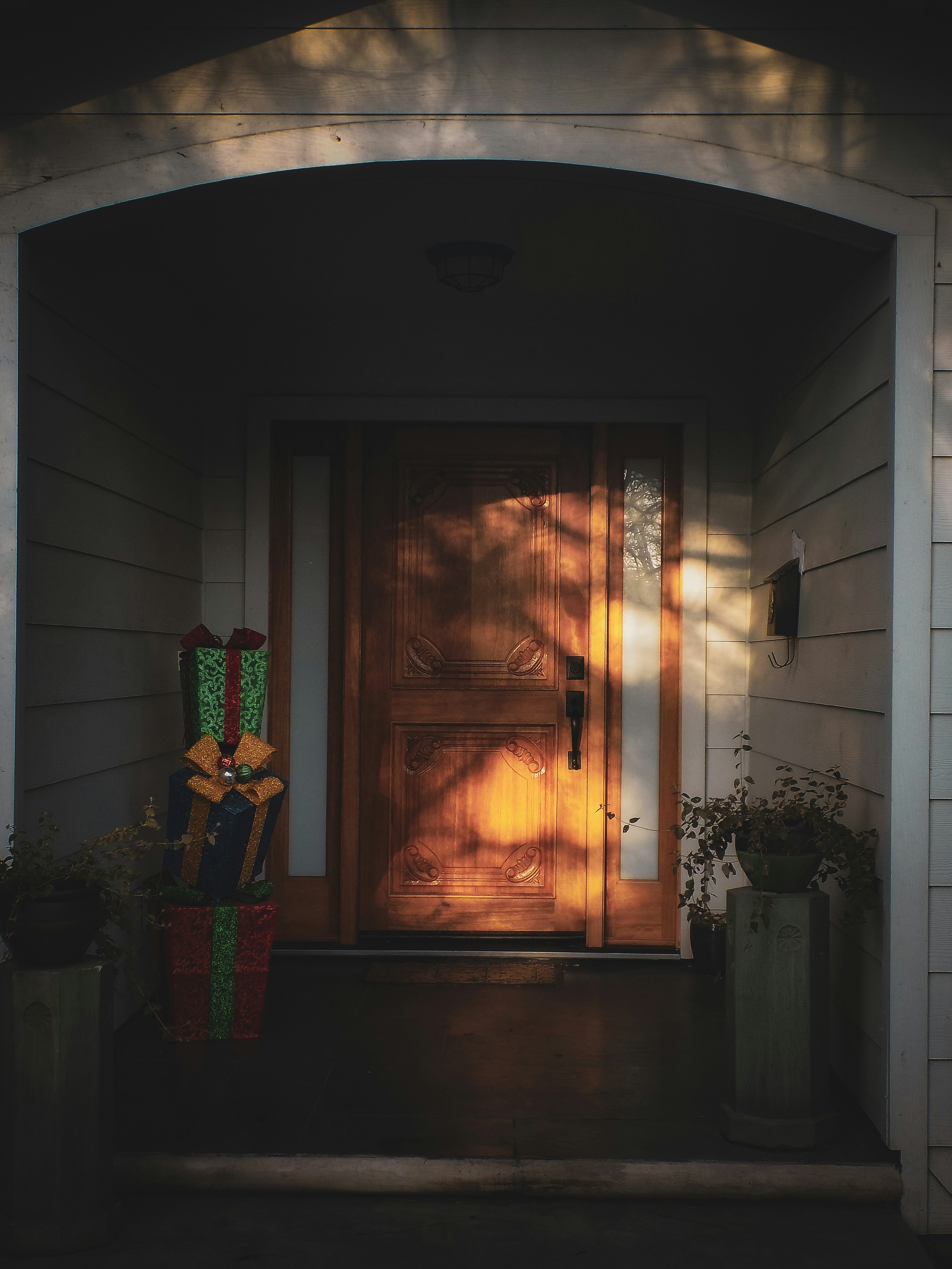 Warm Entryway with Dim Light and Holiday Gifts