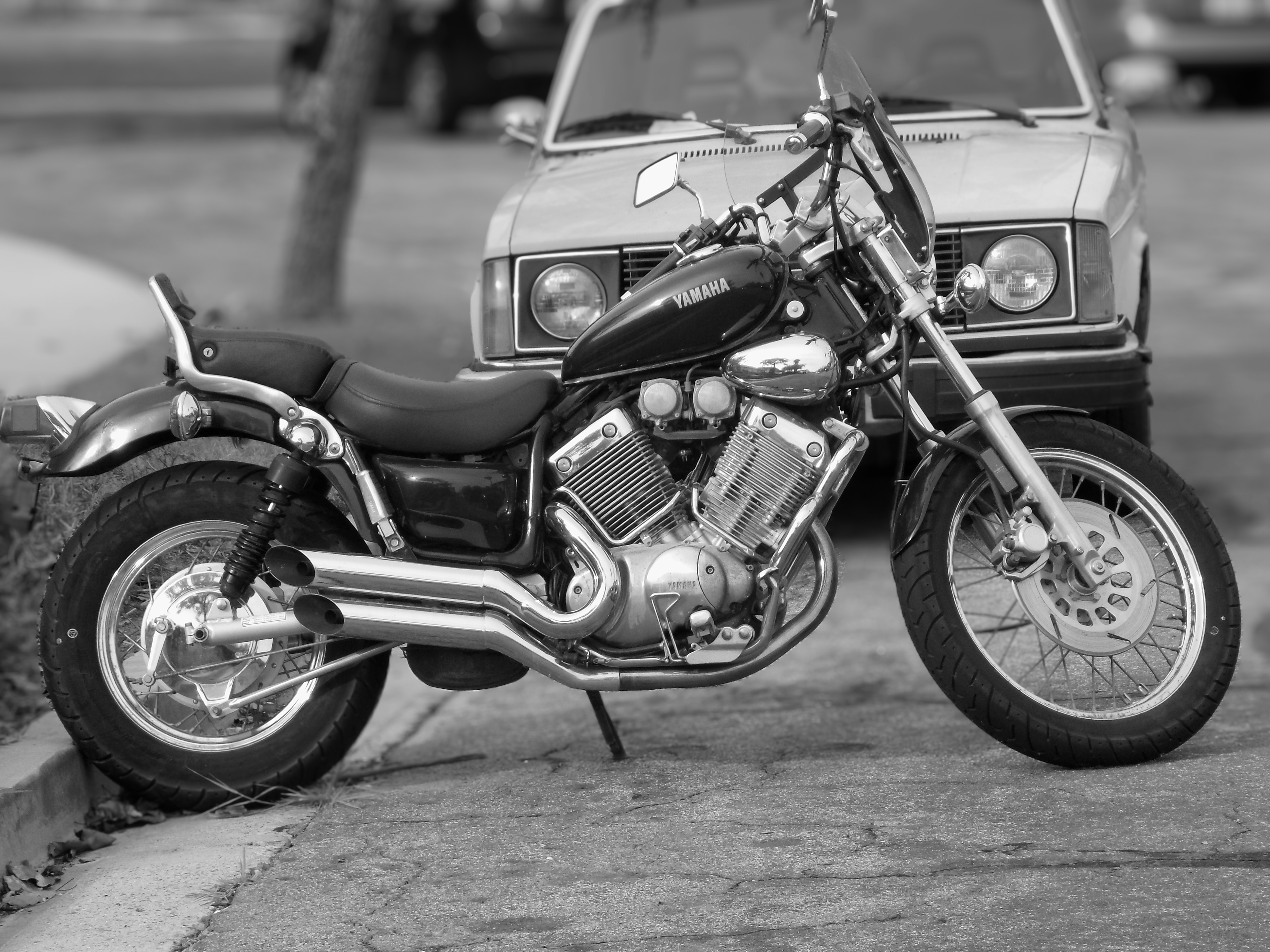 Classic Yamaha Street Scrambler Anchored by a Weathered Front Truck