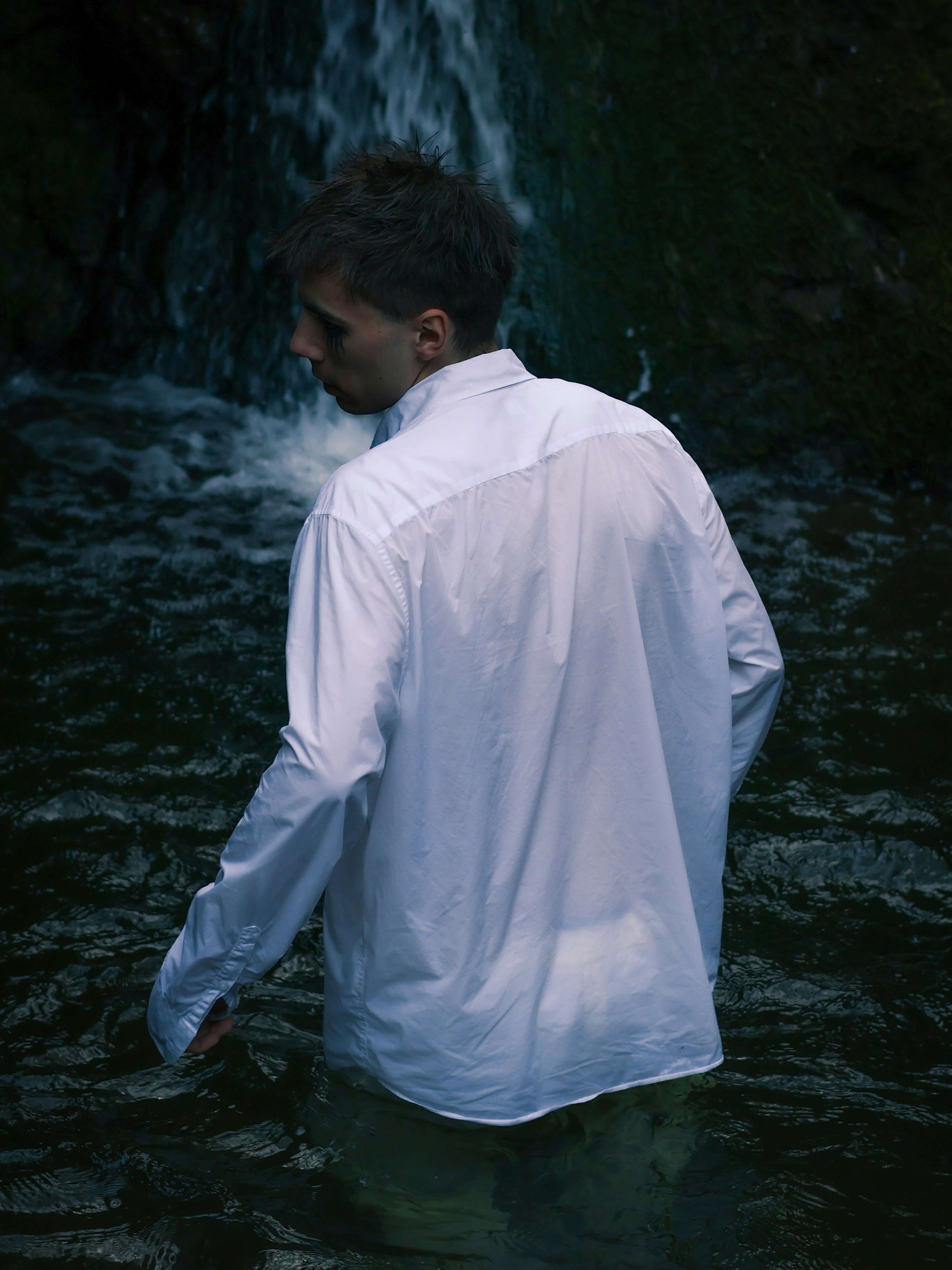 White shirt in a tranquil cascade