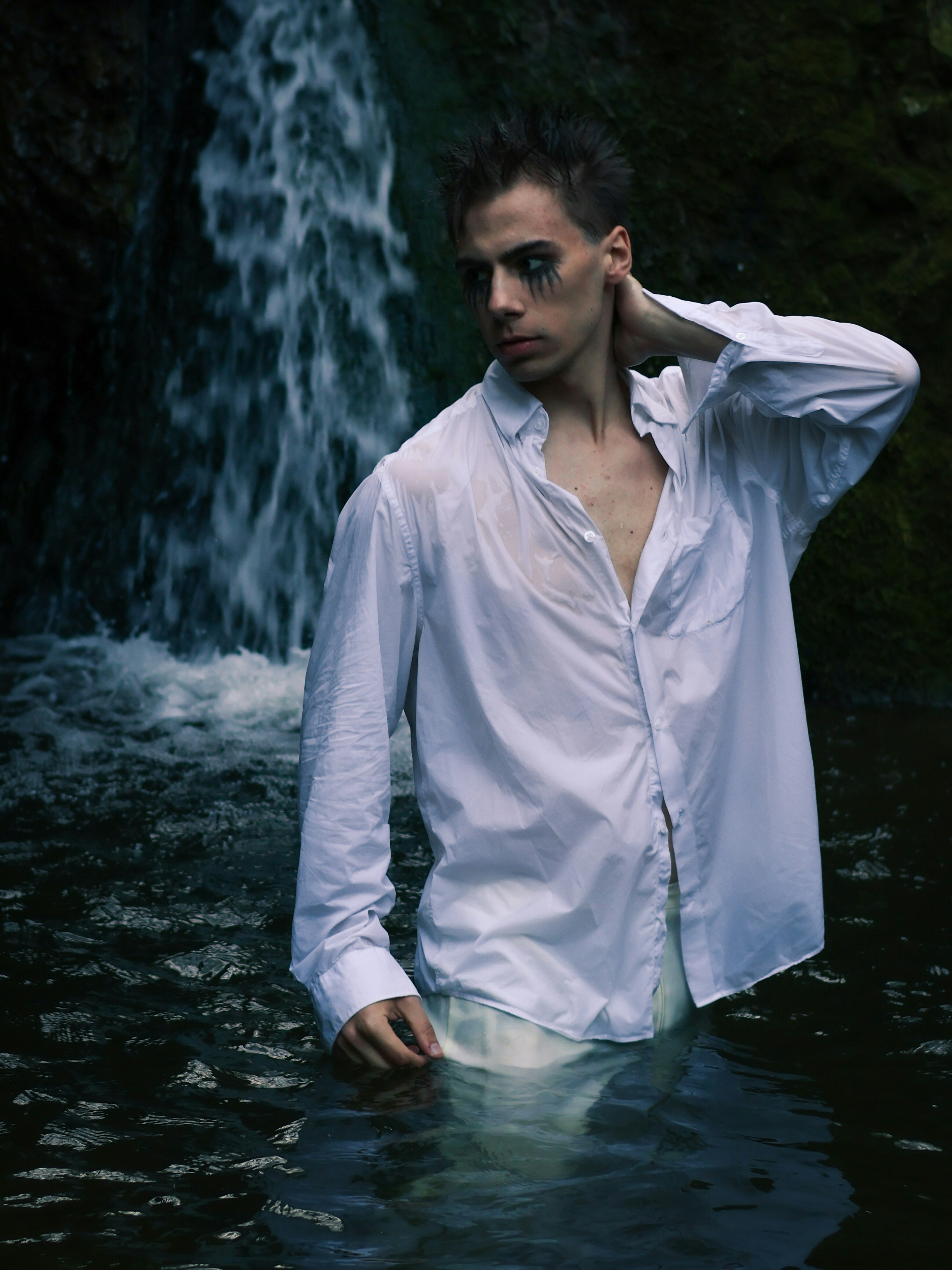 Whispered Reflections: A Quiet Portrait in Cascading Light