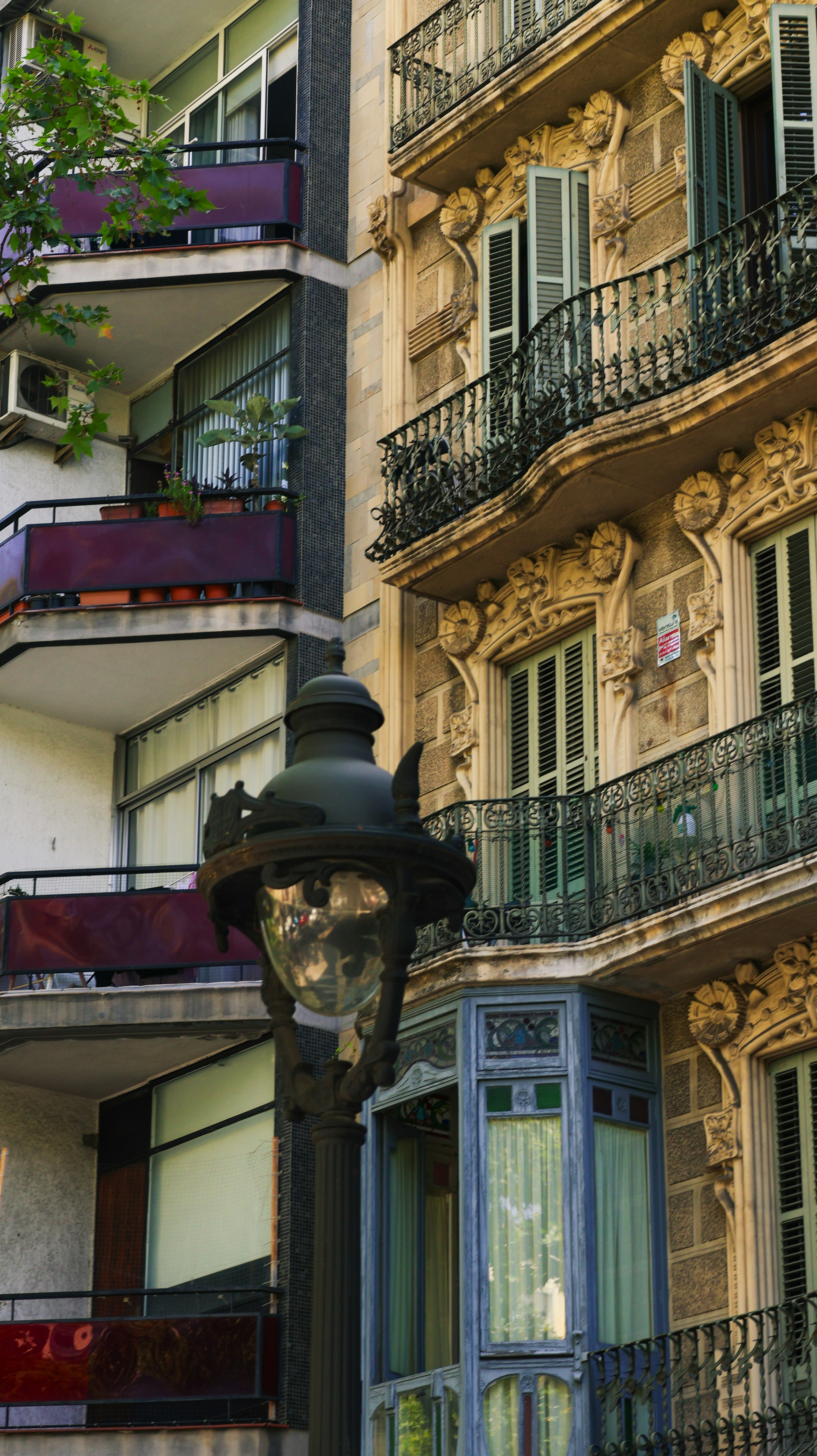 Ornate Facades and a Lantern in a Sunlit Street