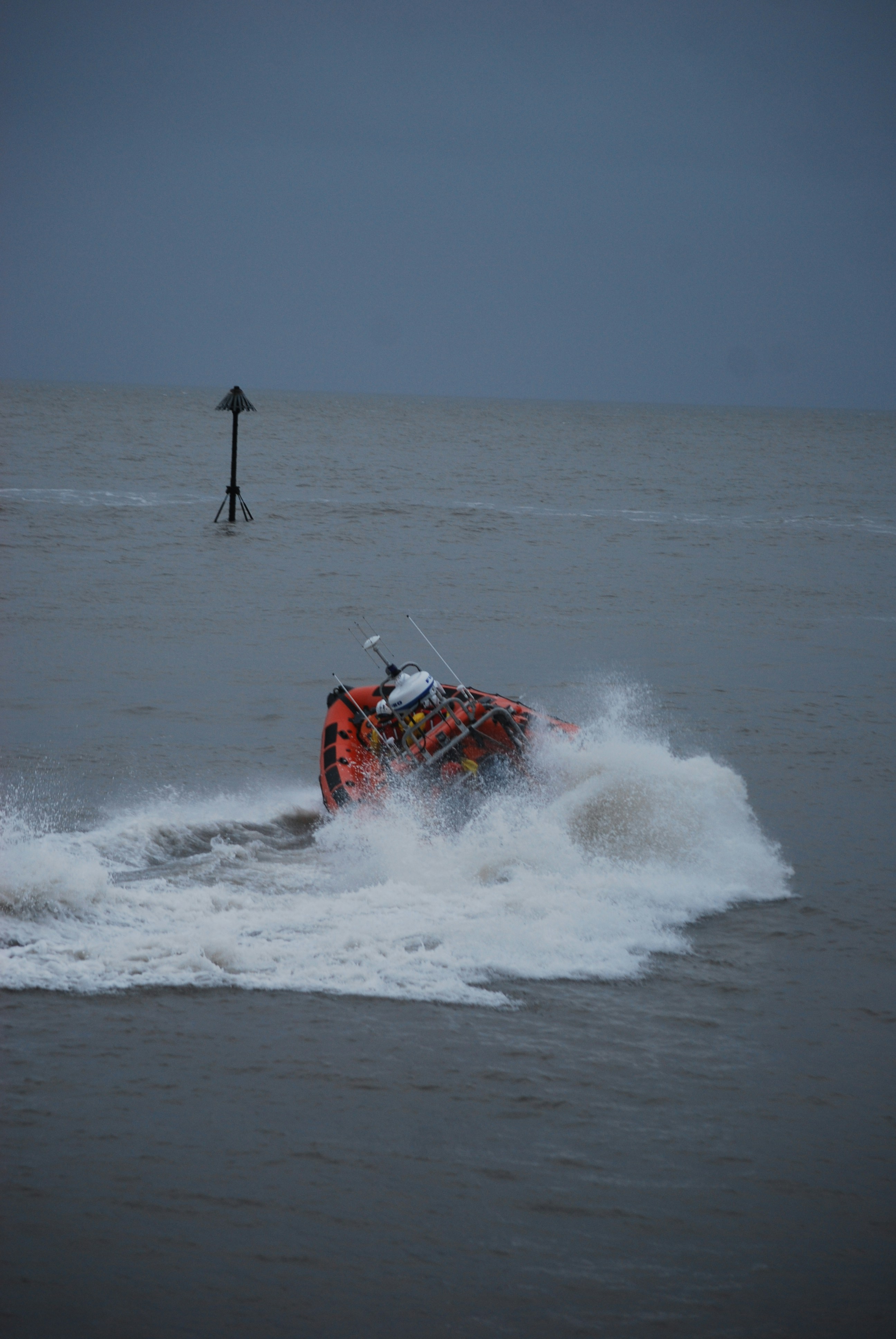 Red Rave on the Wake: A Rescue Boat Rides the Break