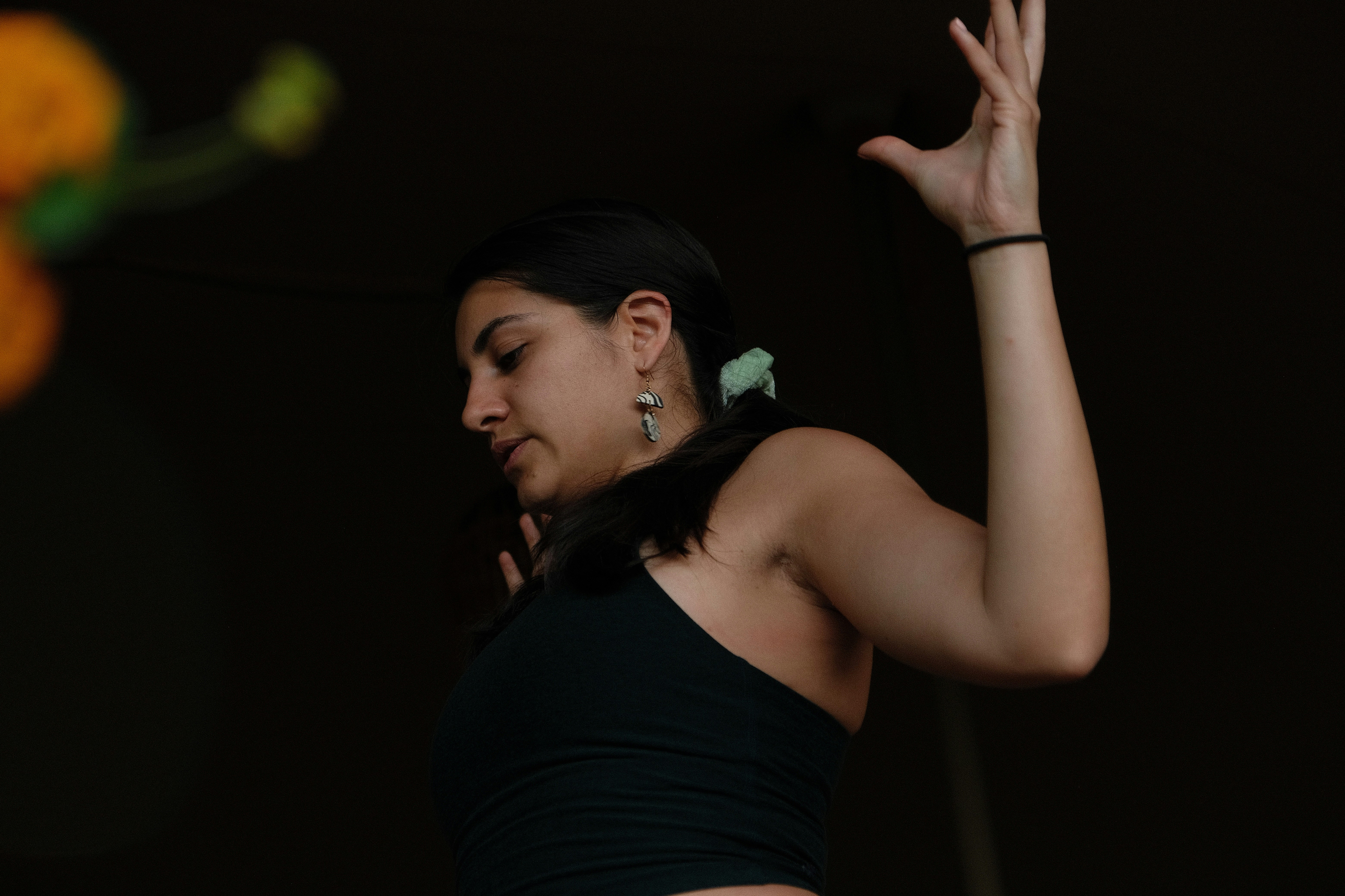 Mid-dance Poise: A Female Dancer in Motion