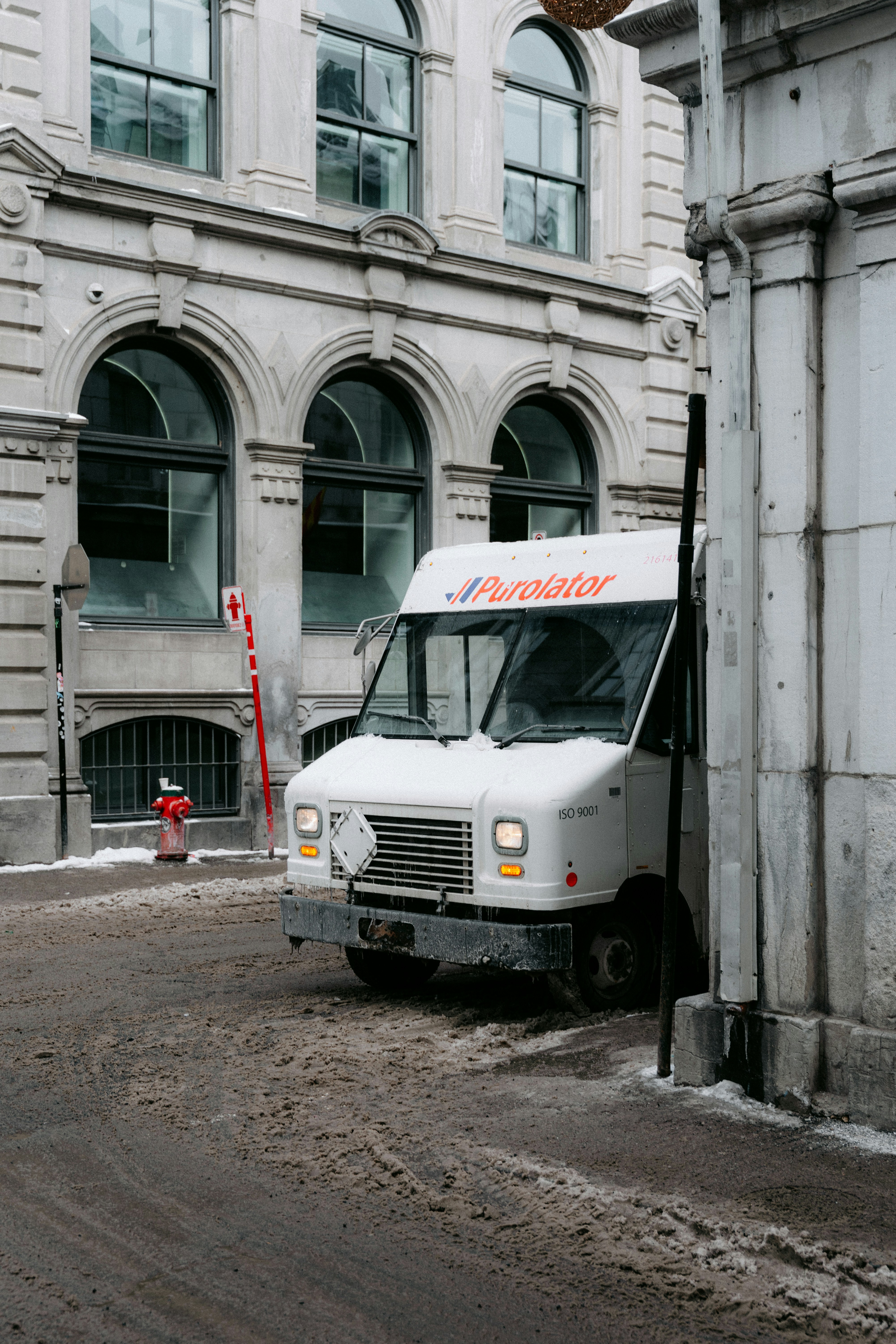 Icebound Delivery on a Marble Street