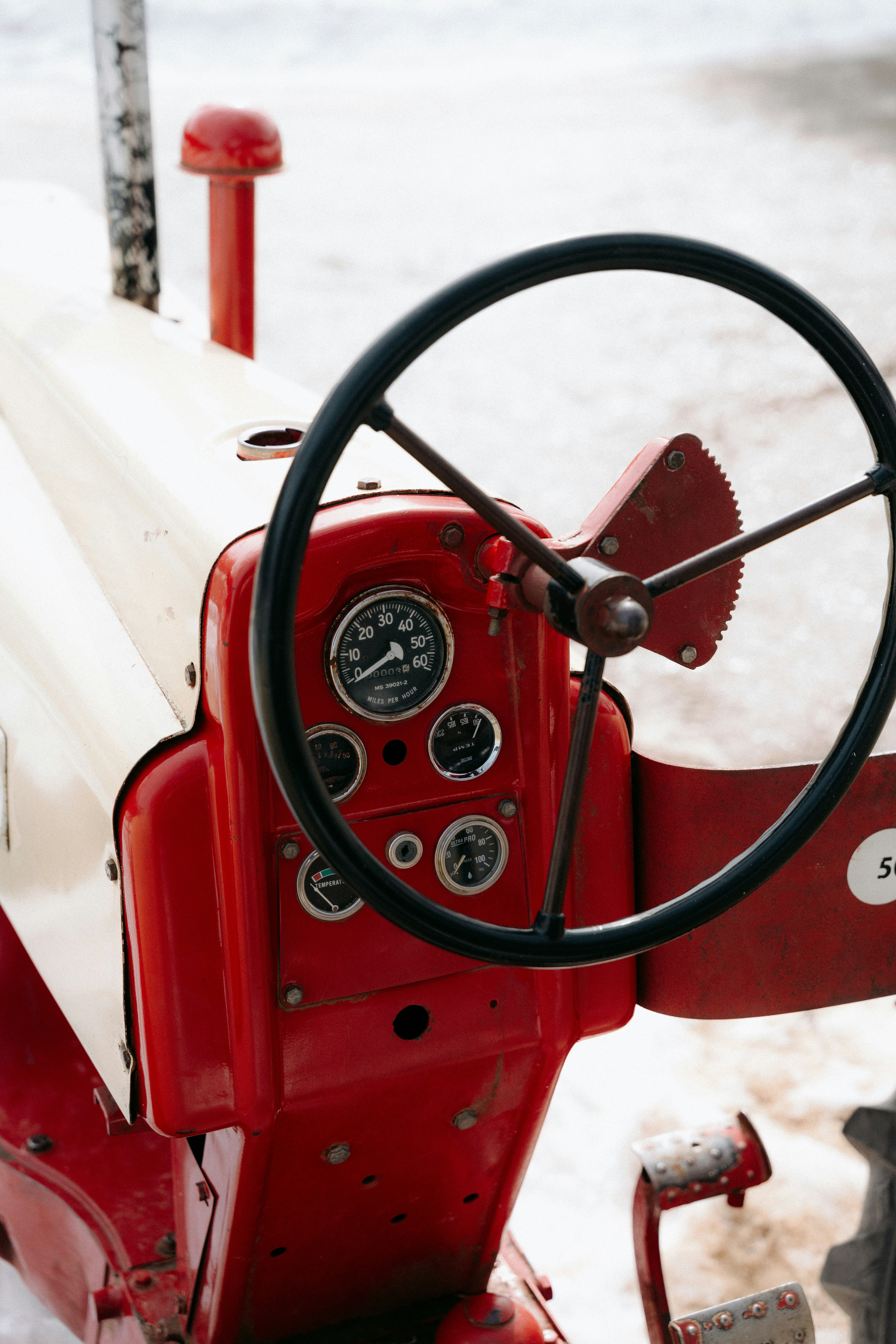 Red Tractor Console: Close-Up on the Steering and Gauges