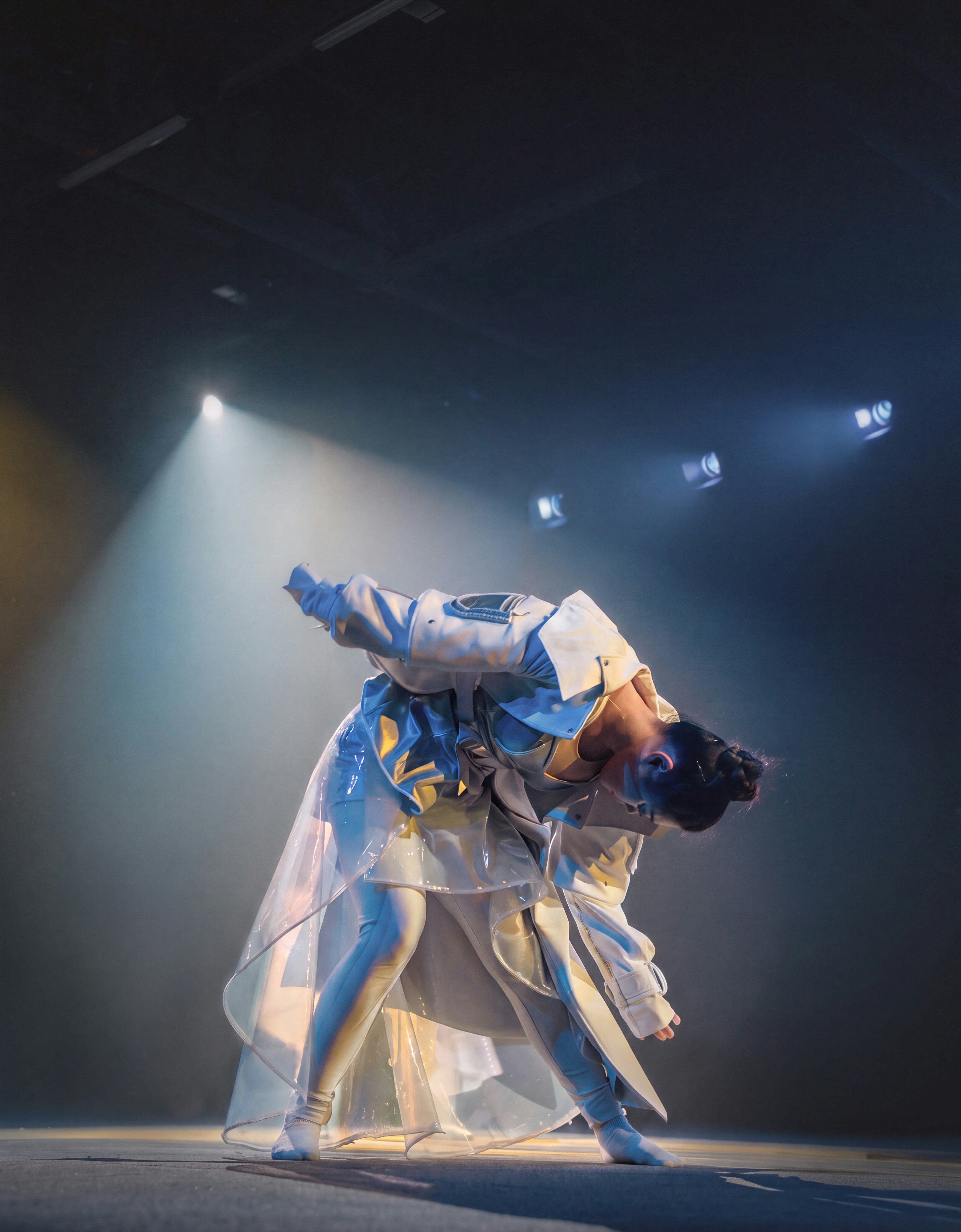 Tilted Grace: a dancer suspended between light and shadow