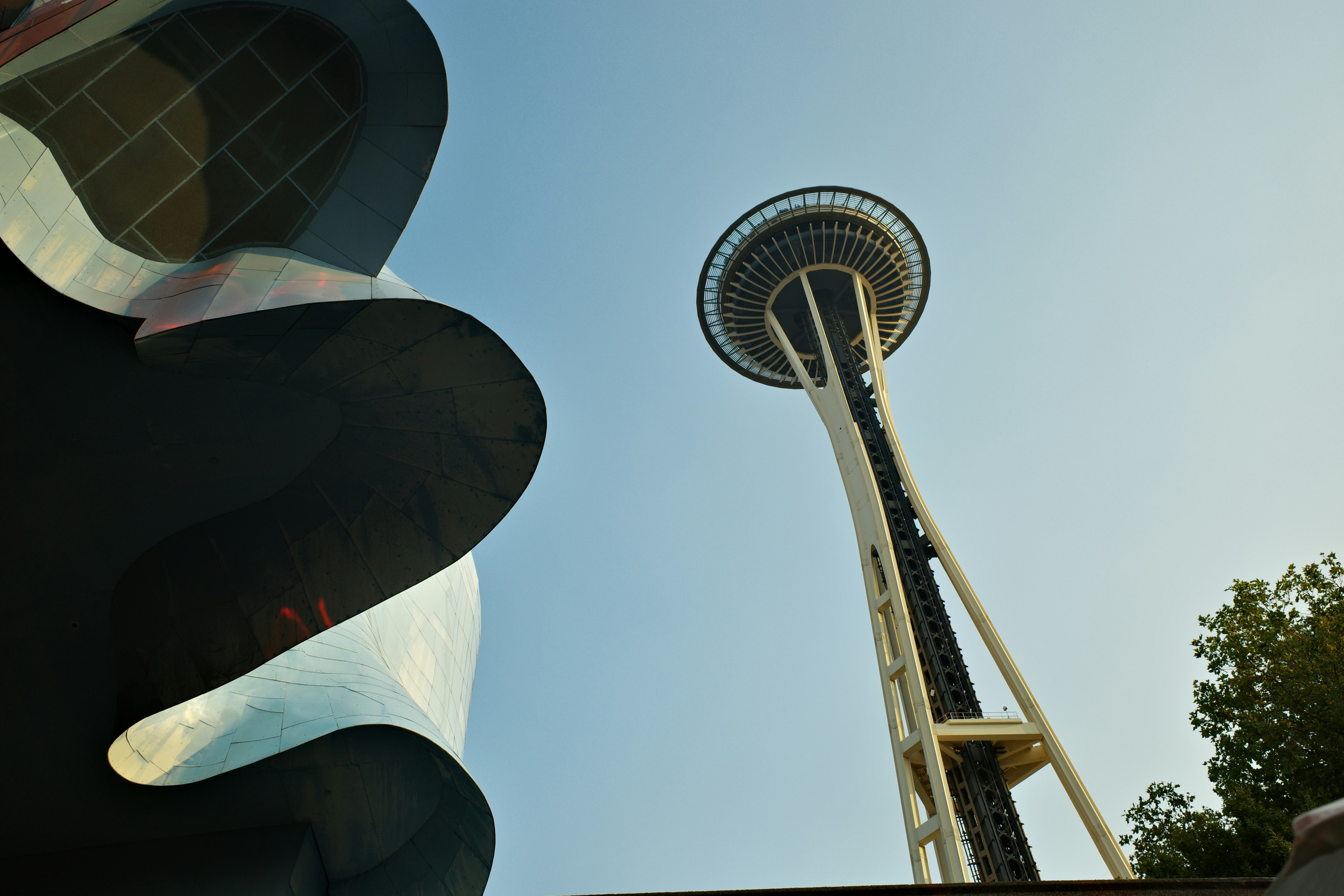 Towering Perspectives: Curves and Spires Above a Modern Landscape