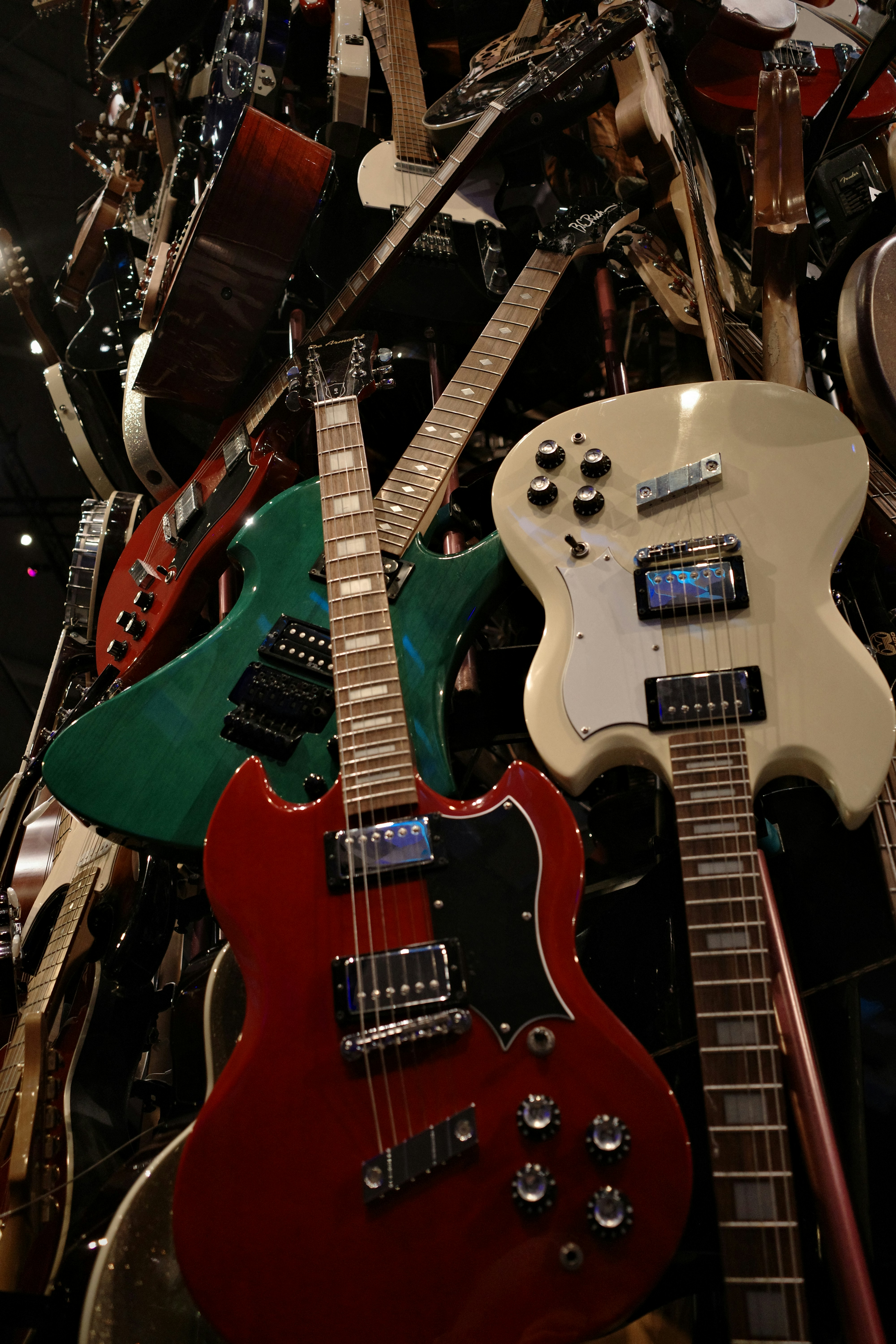 Guitars in a Towering Mosaic