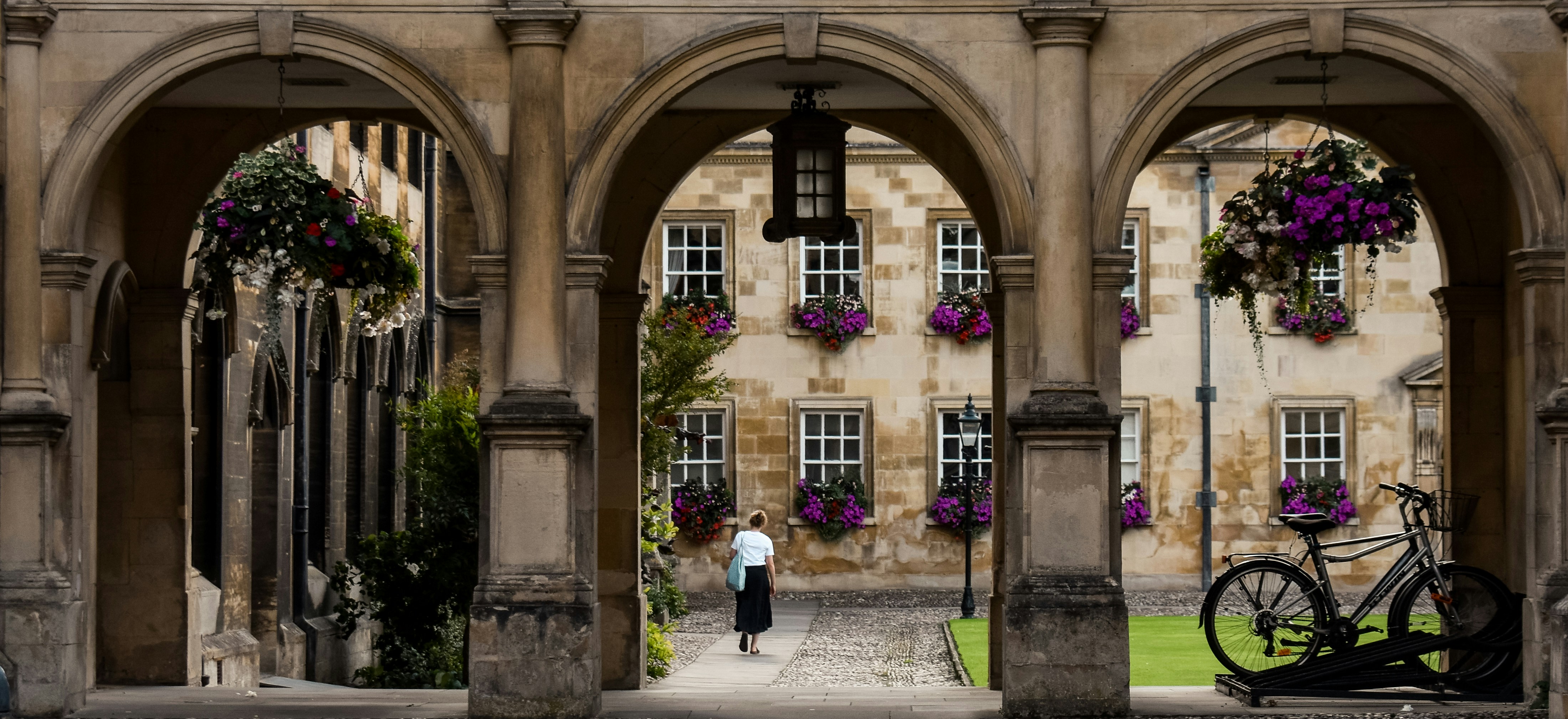 Archway Frame: A Quiet Courtyard Through Stone Arches