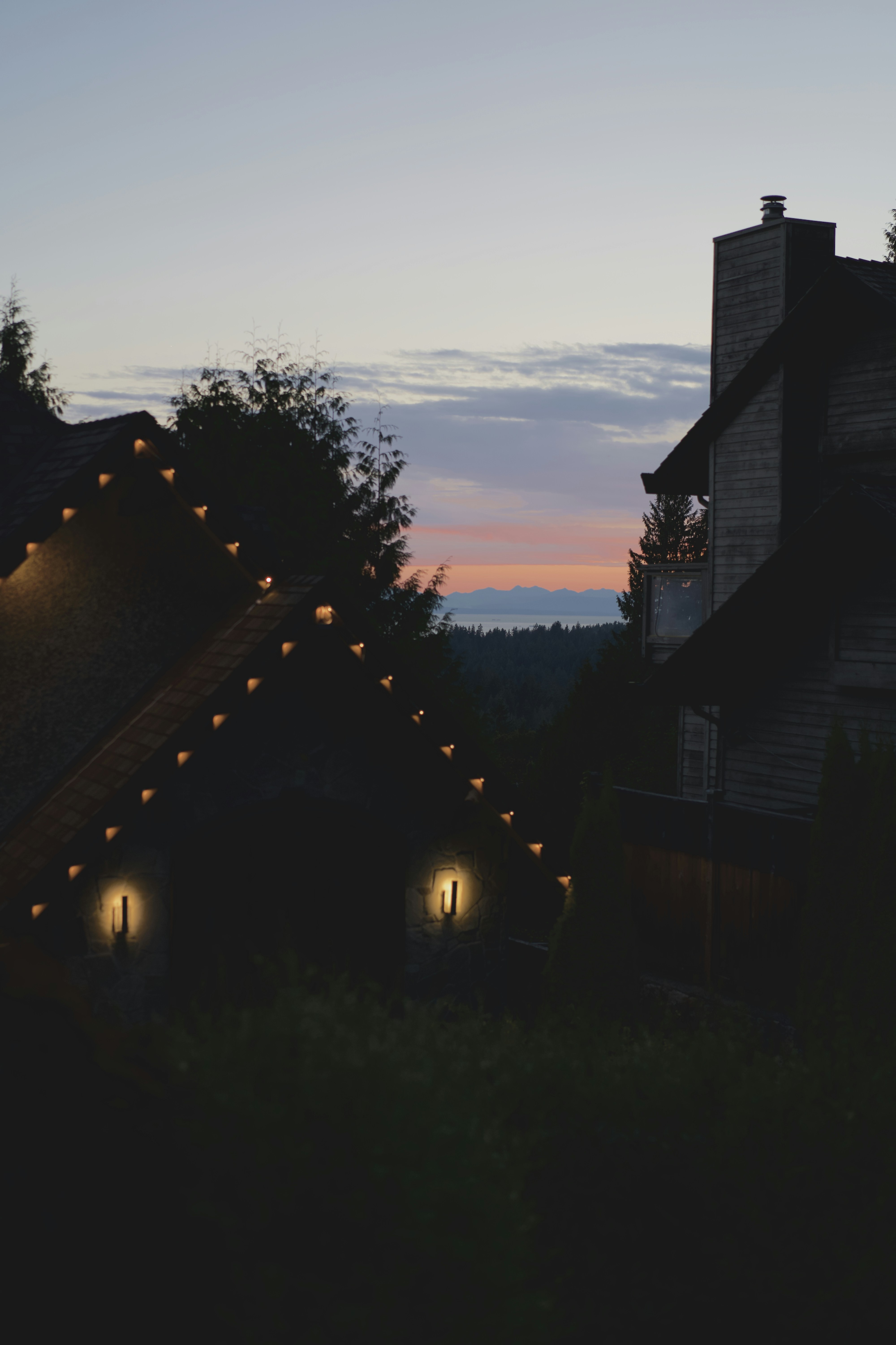 Dusk at the Ridge: Chalet Shadows and Quiet Luminescence