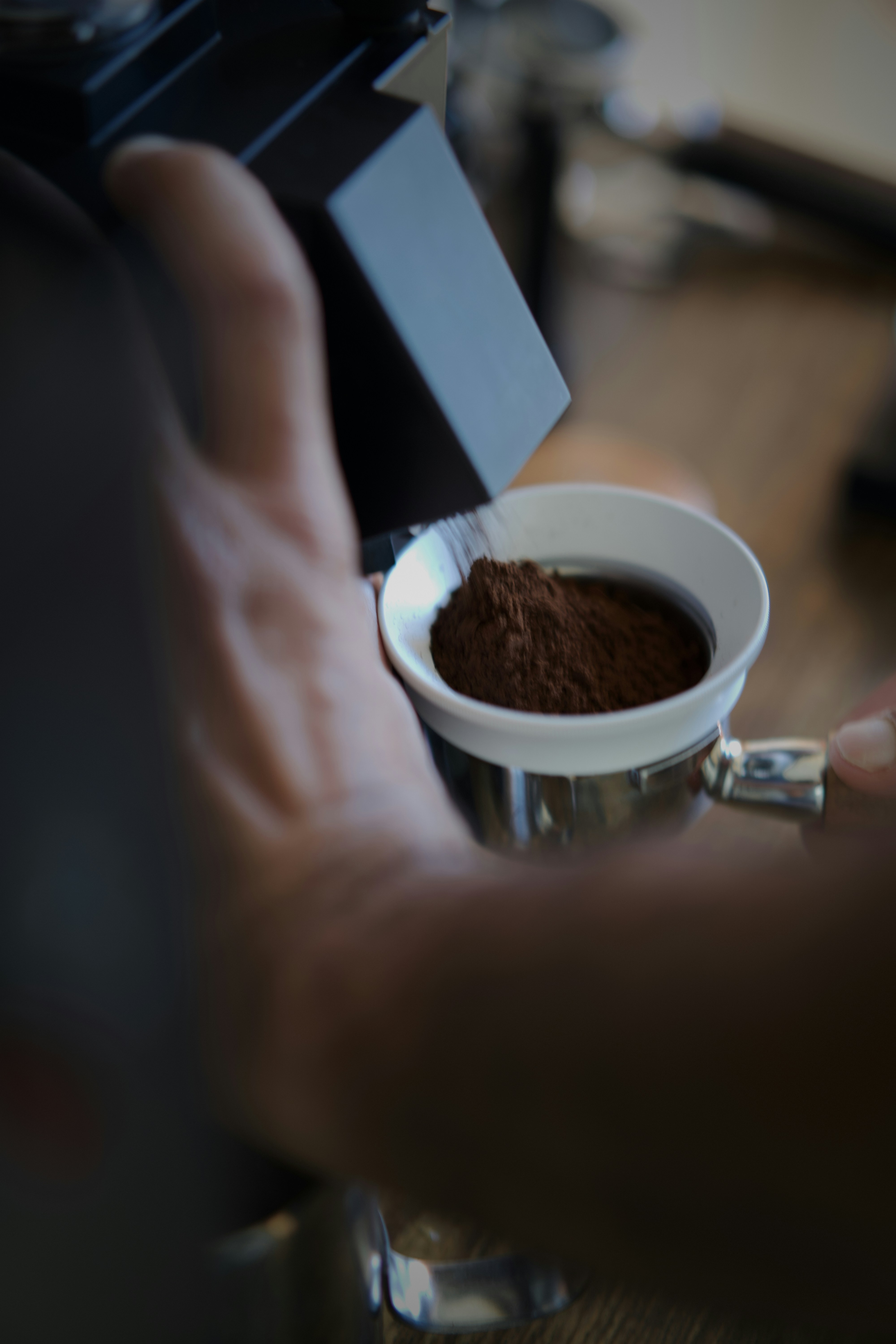 Roasted Moment: Espresso Grinding in a Handheld Portrait