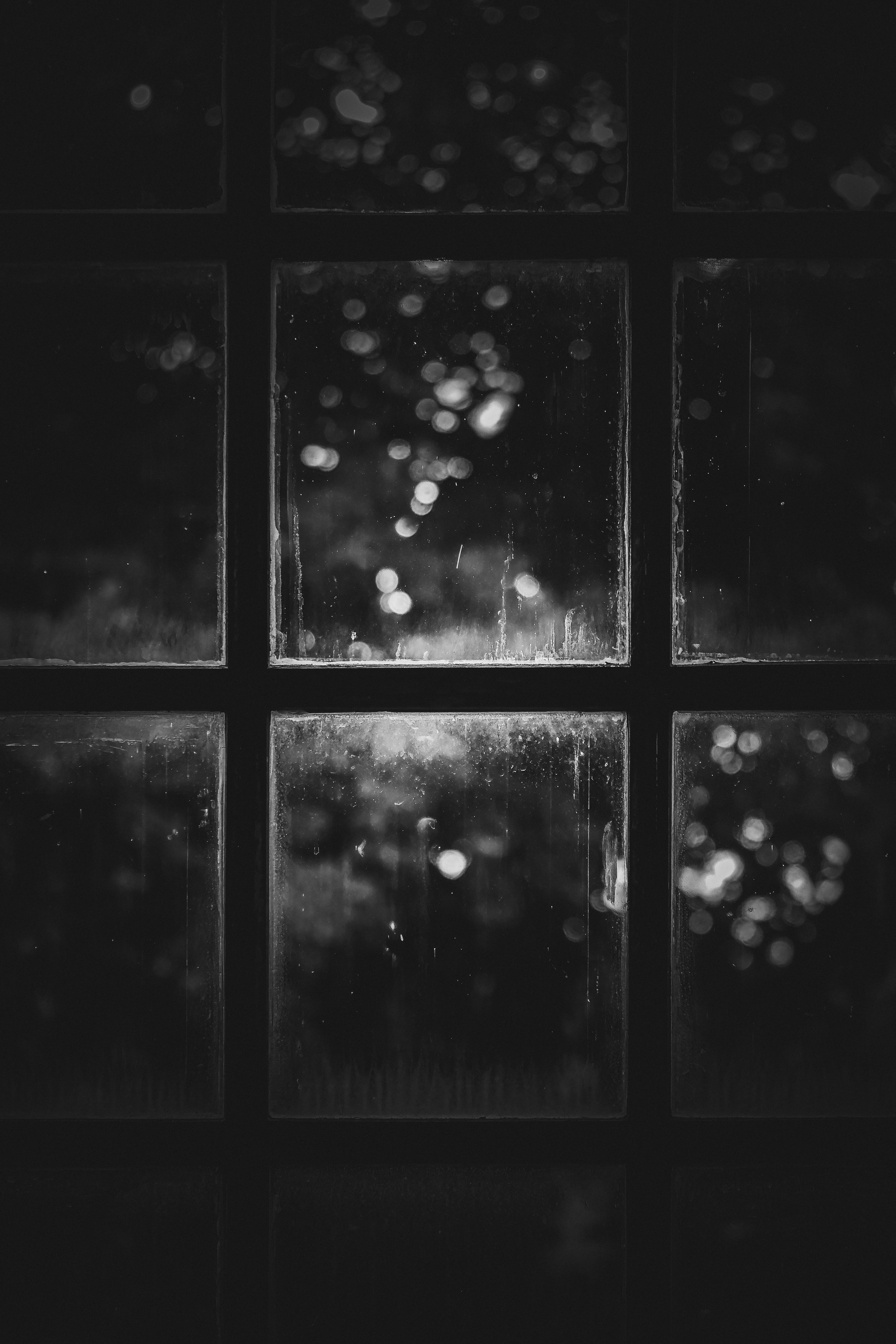 Mist on the Glass: A Quiet Window into Rain-Soaked Shadows