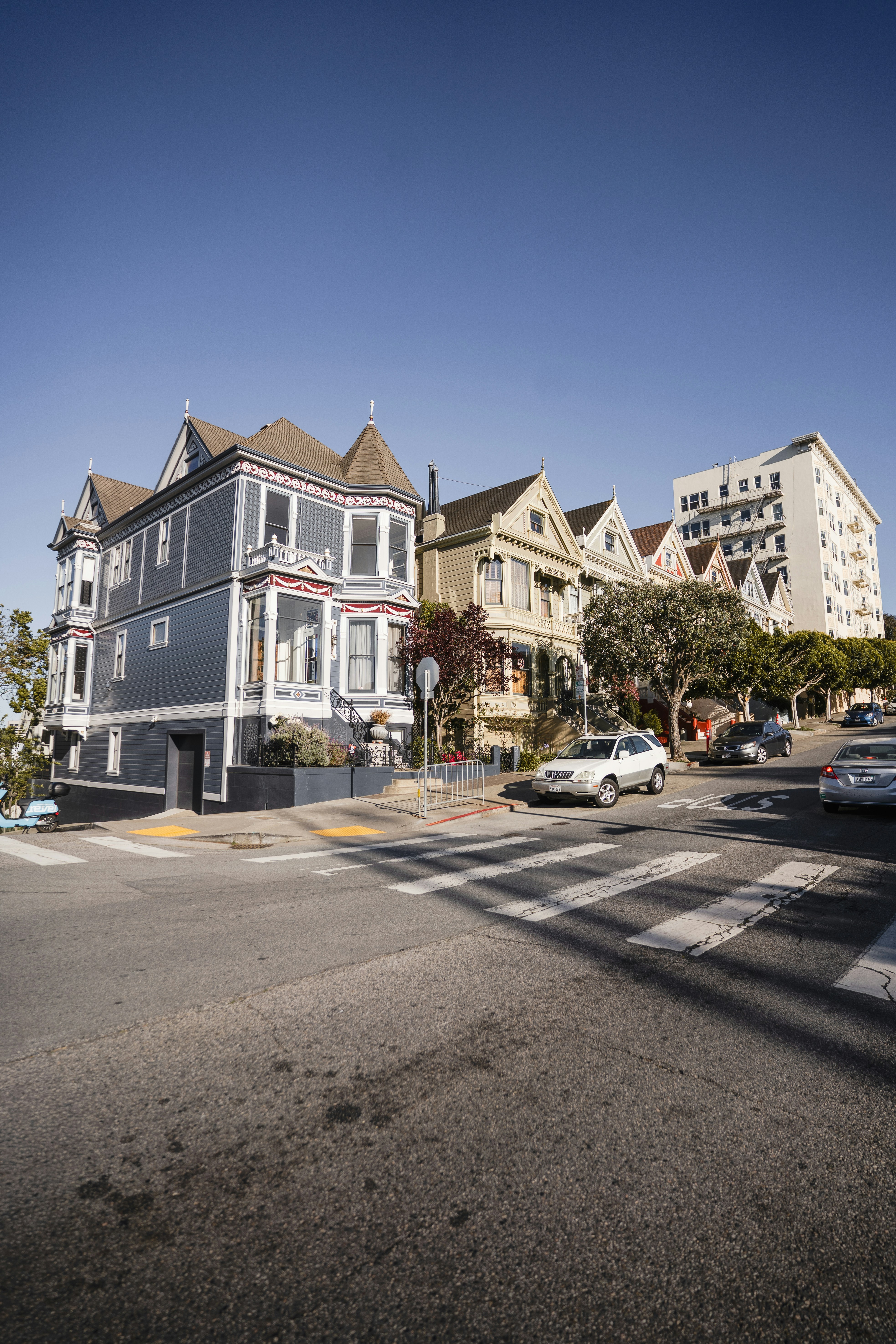 Victorian Row at the Crest: Pastel Facades and a Quiet Street