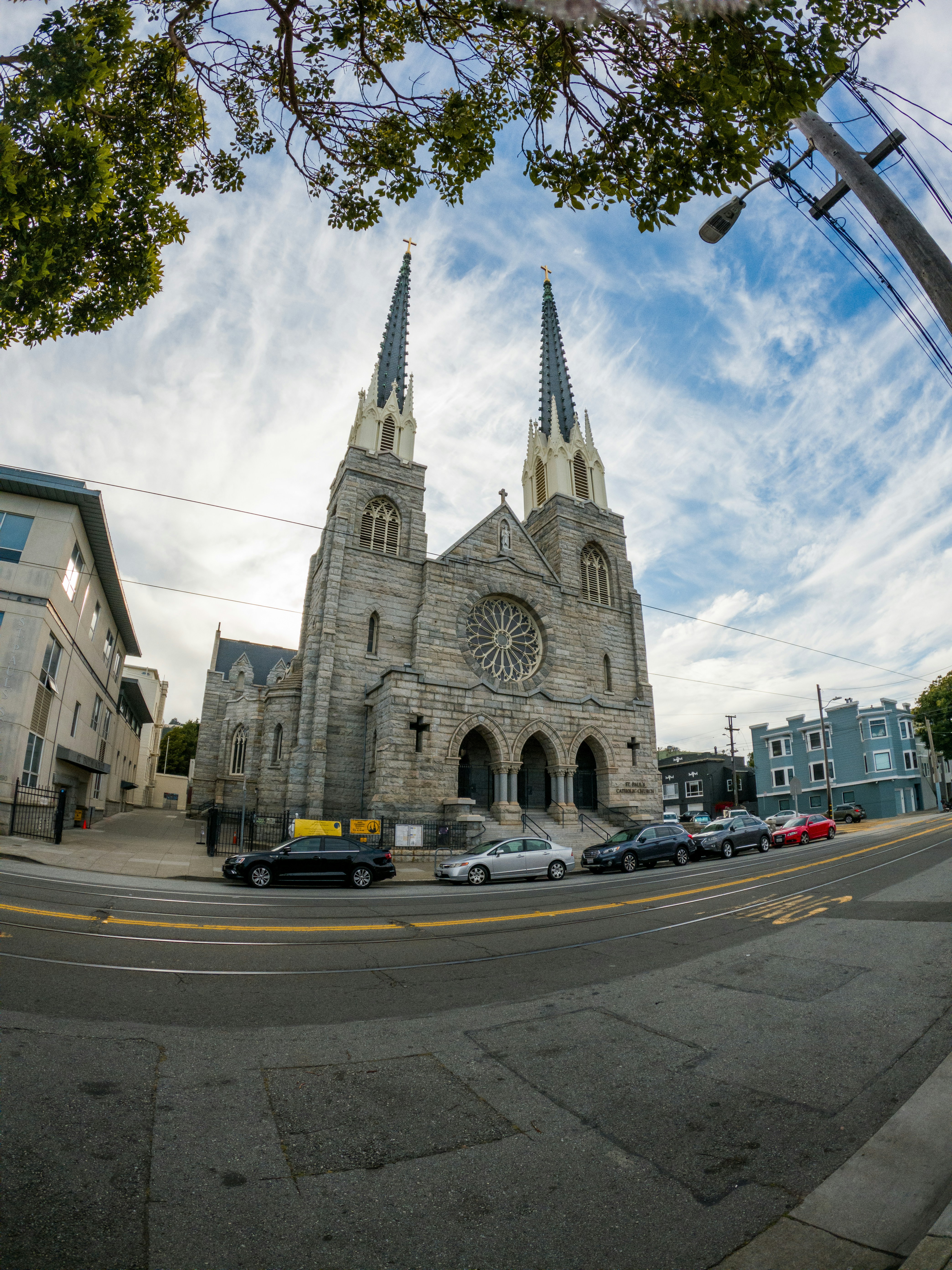 Gothic Cathedral on a Curved Street: A Wide-Angle City Moment