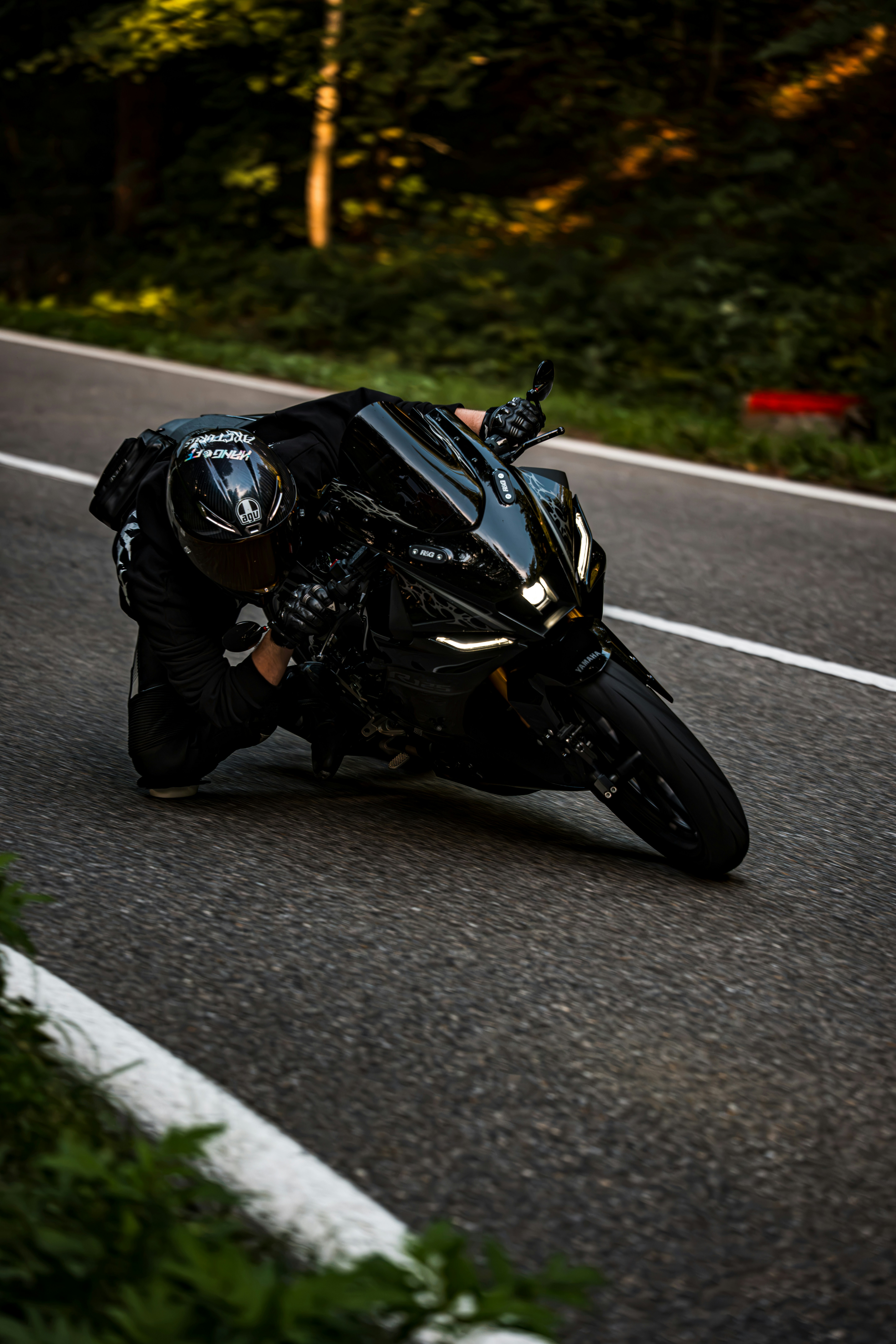 Lean of the Night Rider: A Black Phantom on Asphalt