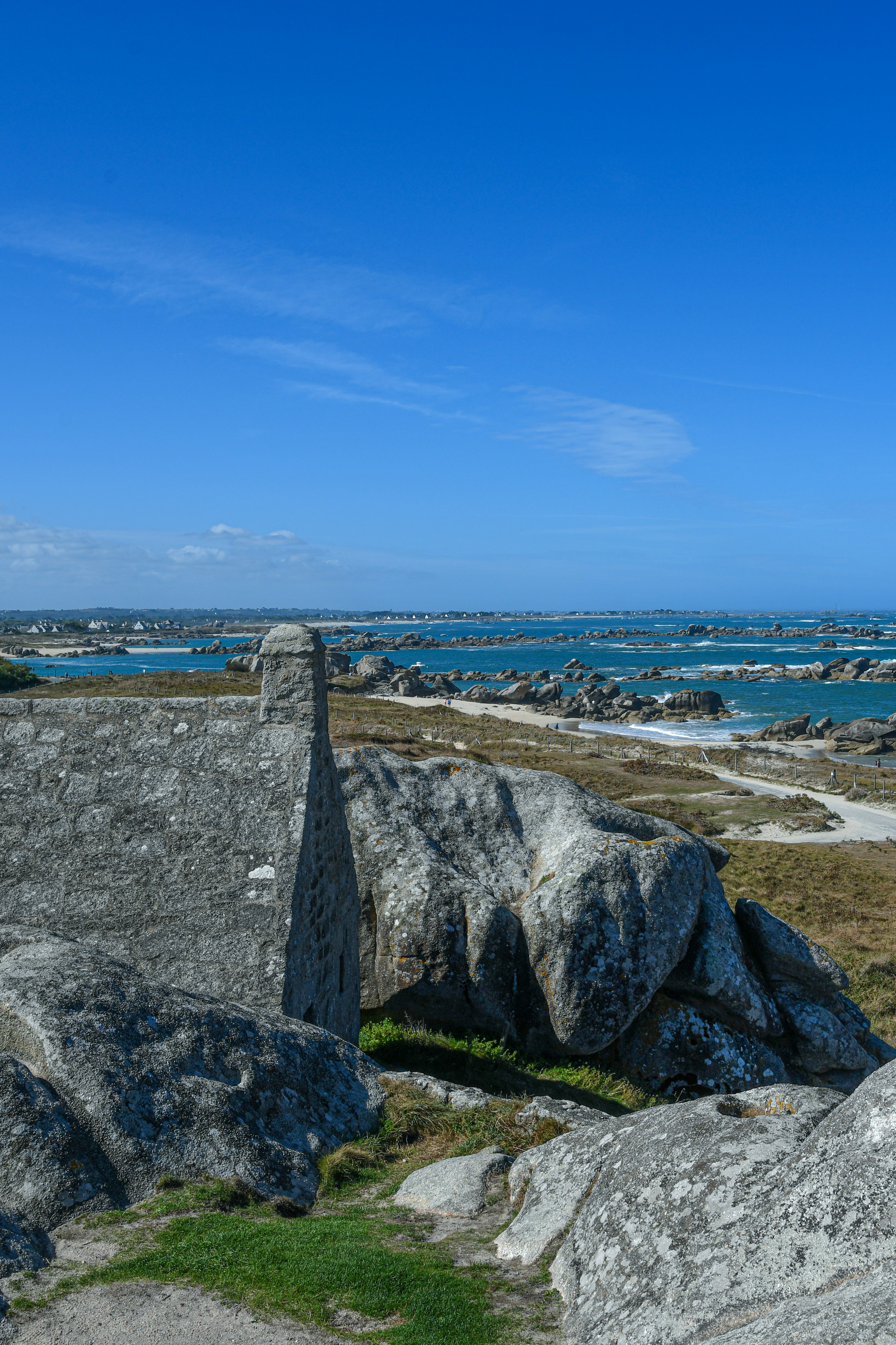 Stone Sentinel Overlooking a Windswept Shore