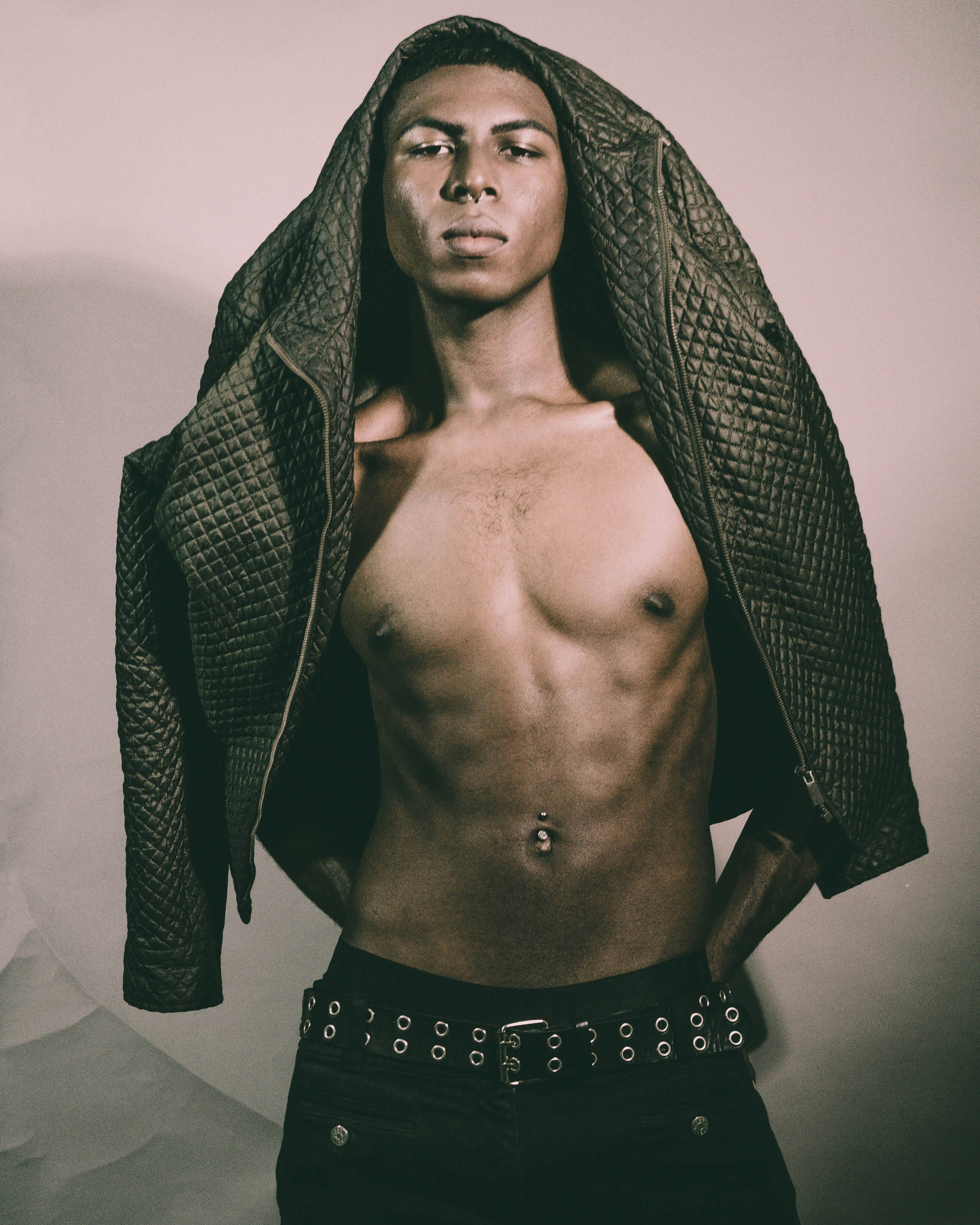 Midnight Confidence: A Portrait Steeped in Leather and Light