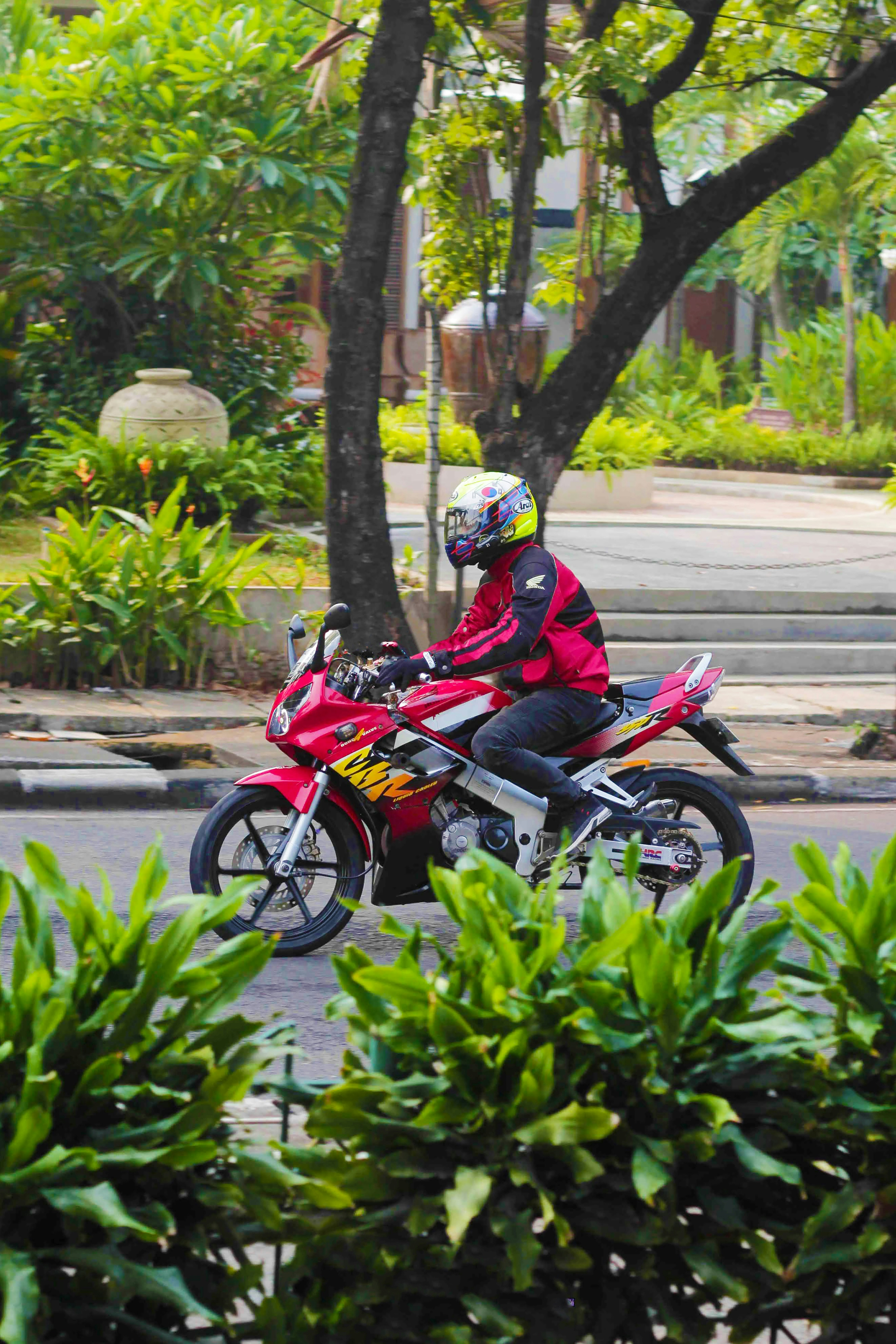 Red Rider on a Quiet Urban Lane