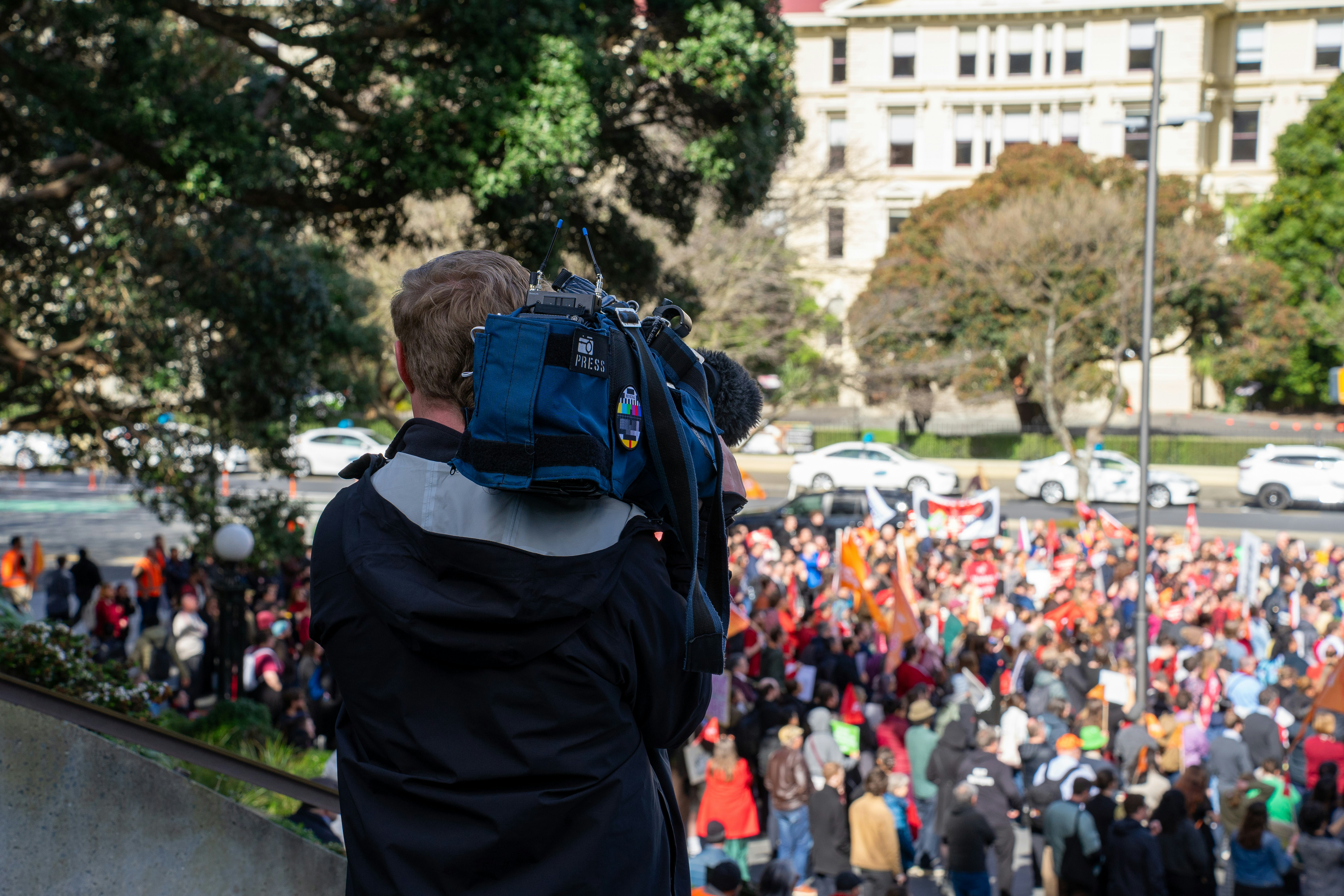 Cameraman at the Edge: Capturing a Crowd from the Balcony