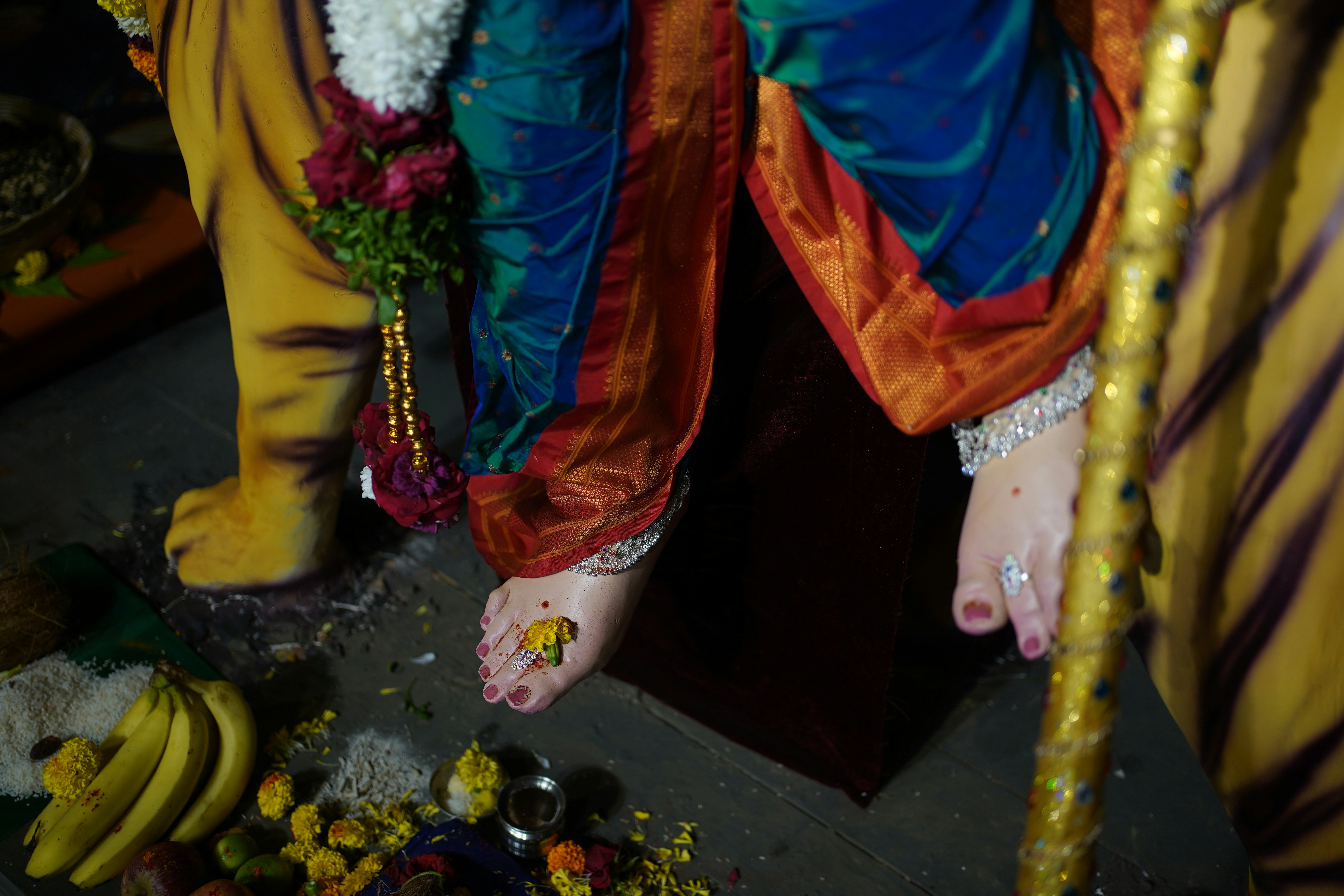 Grounded Reverence: Footwear and Feet Embellished in Ornate Attire